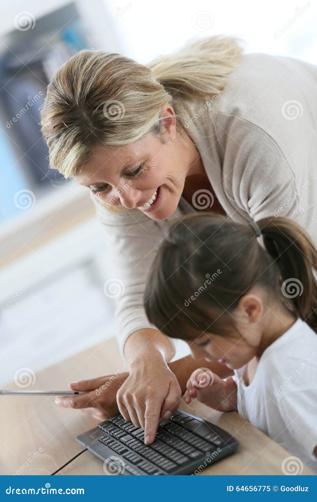 Teacher Showing Little Girl How To Use Computer Stock Image - Image of ...