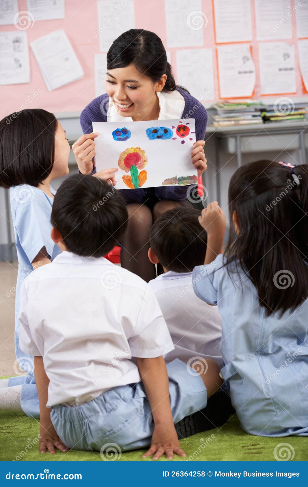 Teacher Showing Painting To Students Stock Photo - Image of female ...