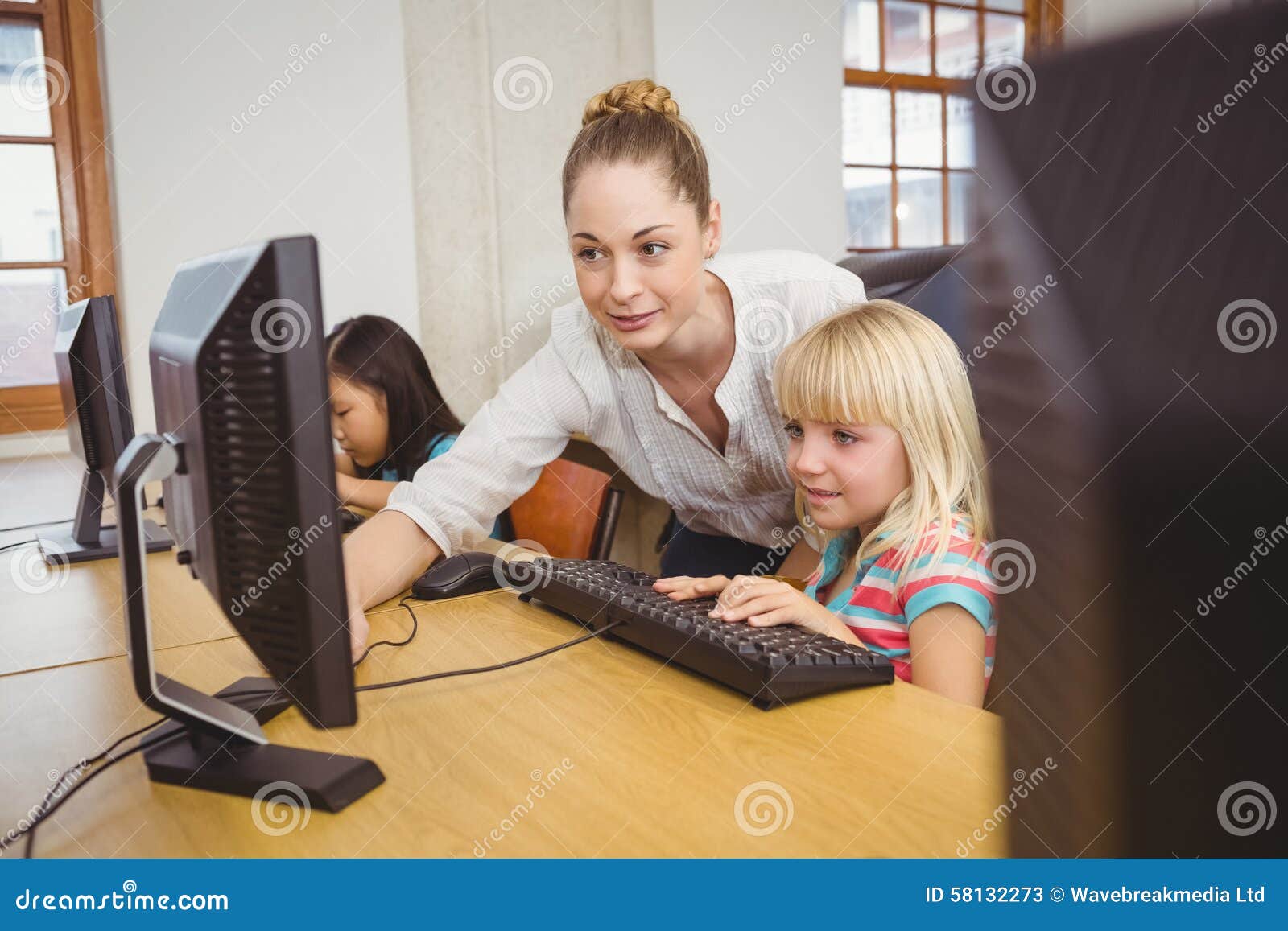 Teacher Showing Student How To Use a Computer Stock Image - Image of ...