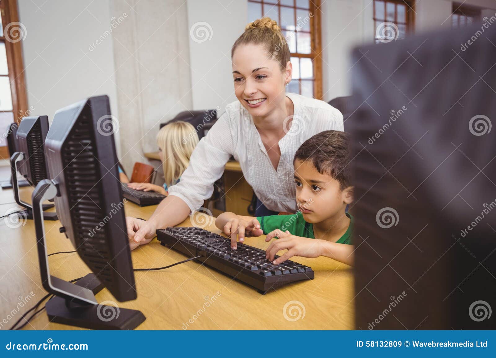 Teacher Showing Student How To Use a Computer Stock Image - Image of ...