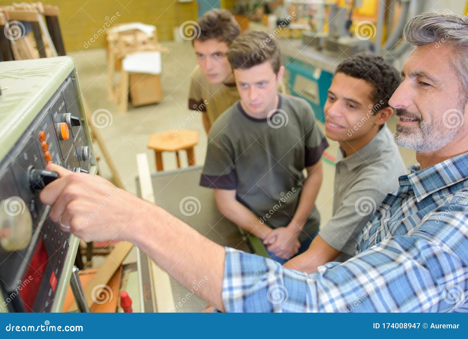 Teacher Showing Students How To Use Machinery Stock Image - Image of ...
