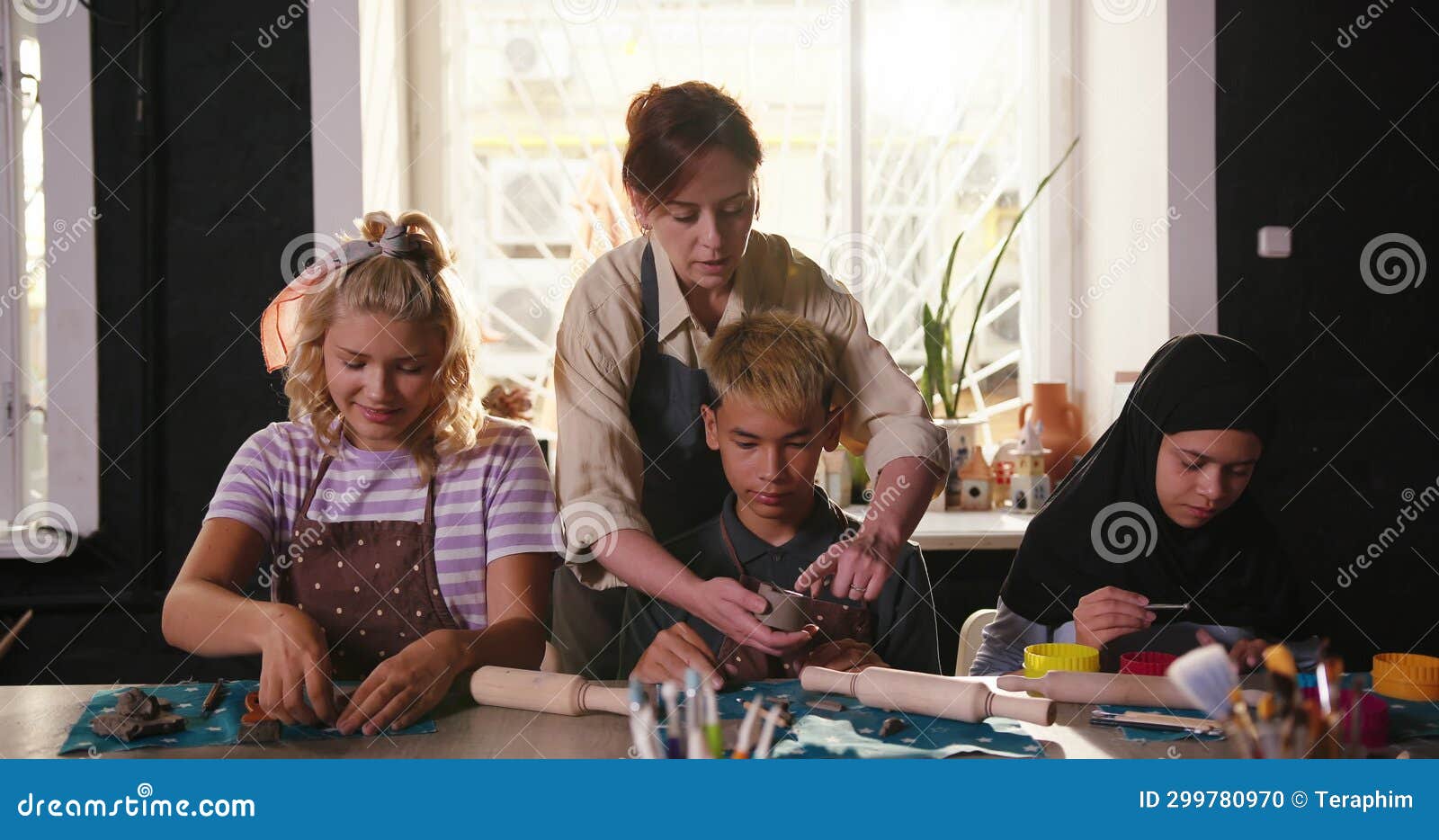 Teacher Shows Student Technique of Modeling Clay Element Stock Footage ...