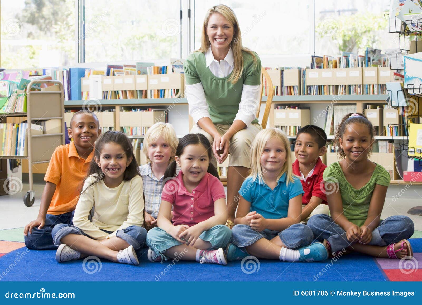 Teacher Sitting In Classroom Royalty-Free Stock Photo | CartoonDealer ...