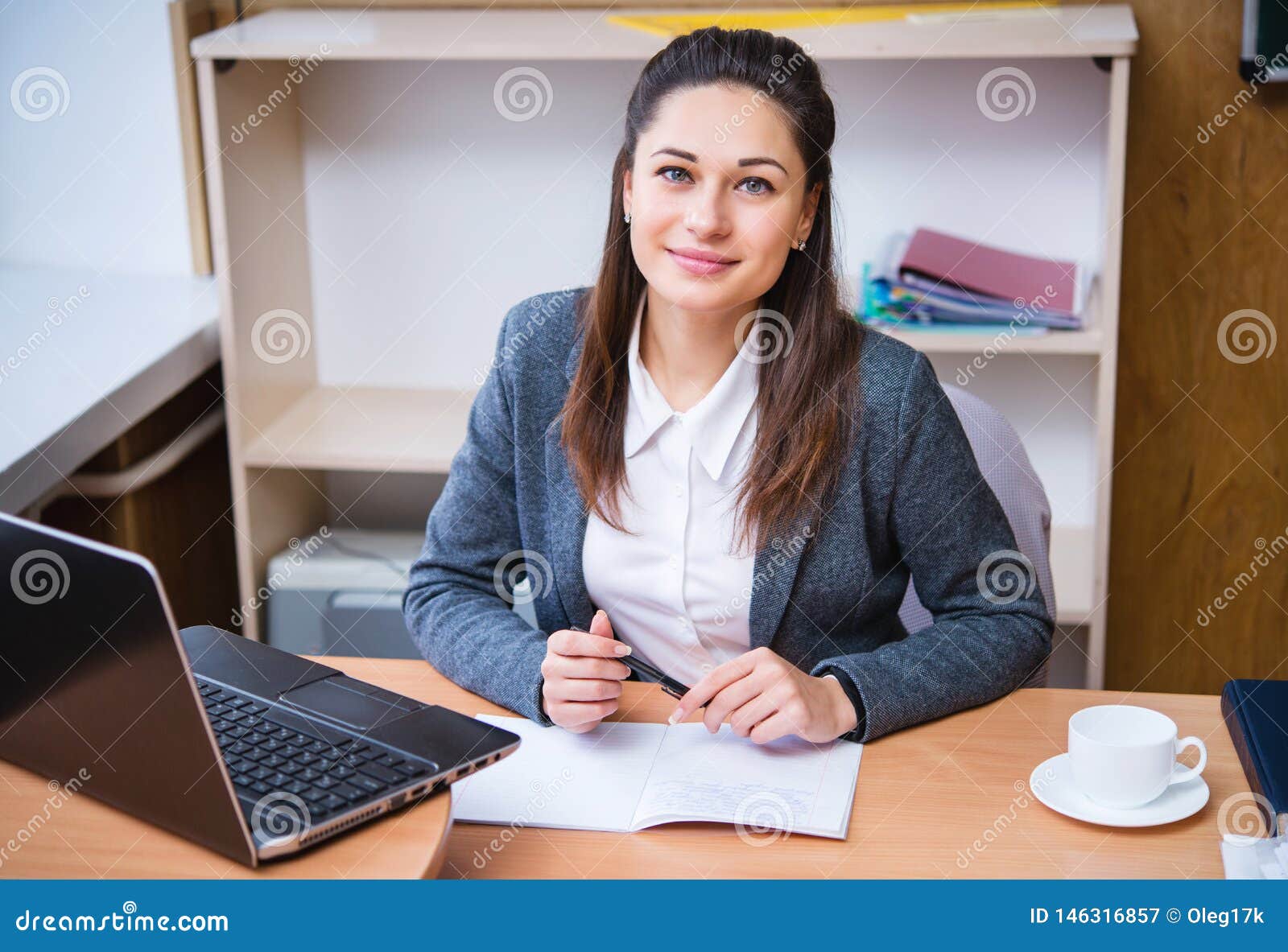 A Teacher Sitting at the Desk Stock Image - Image of knowledge, happy ...