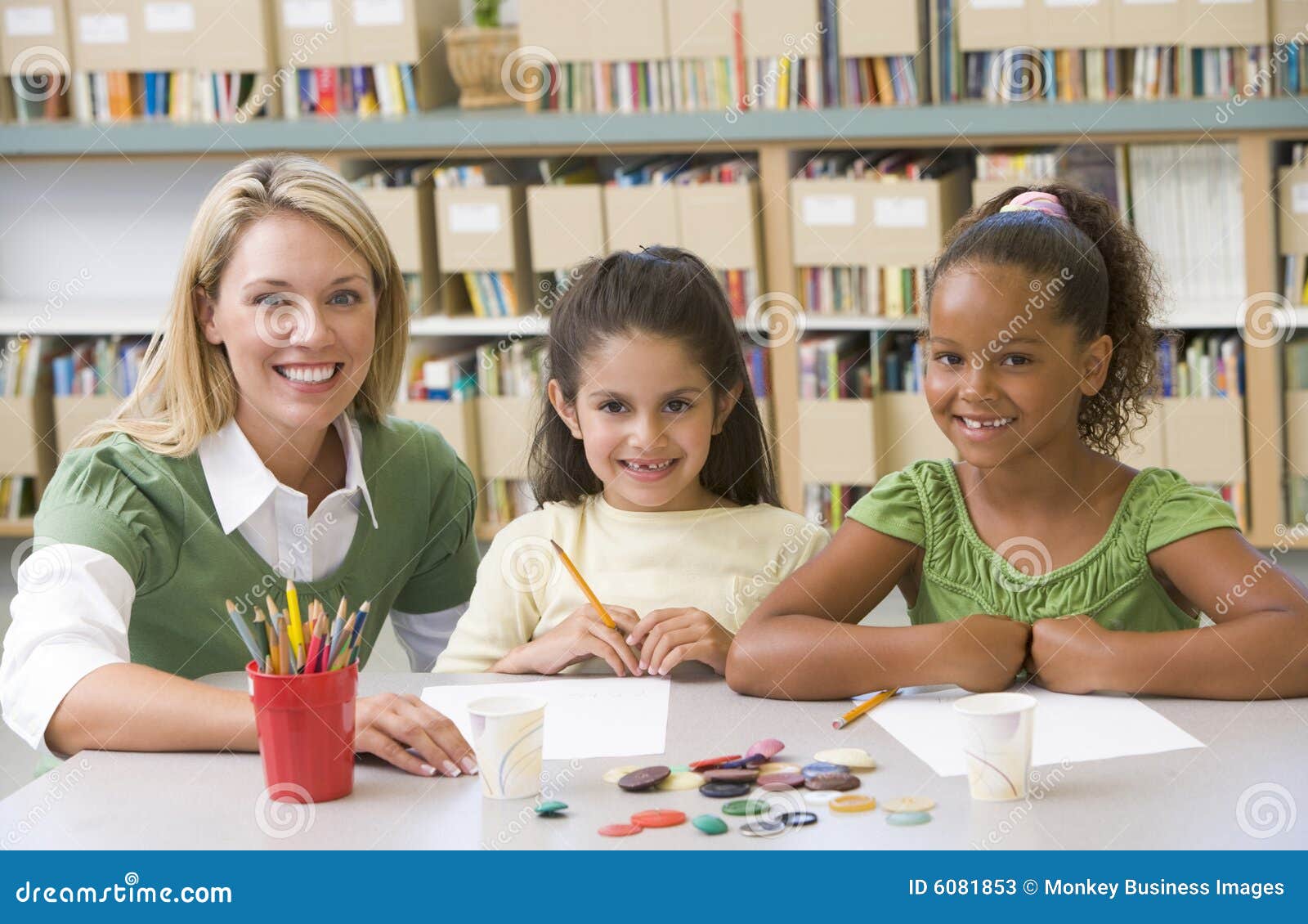 Teacher Sitting with Students in Art Class Stock Image - Image of girls ...