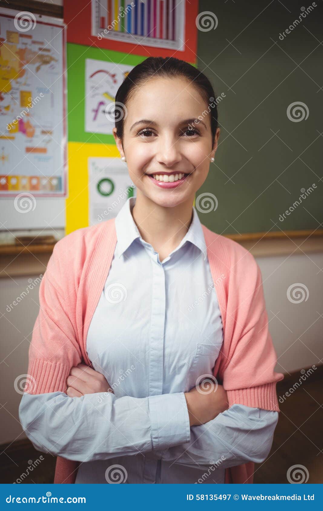 Teacher Smiling at Camera in Classroom Stock Image - Image of adult ...