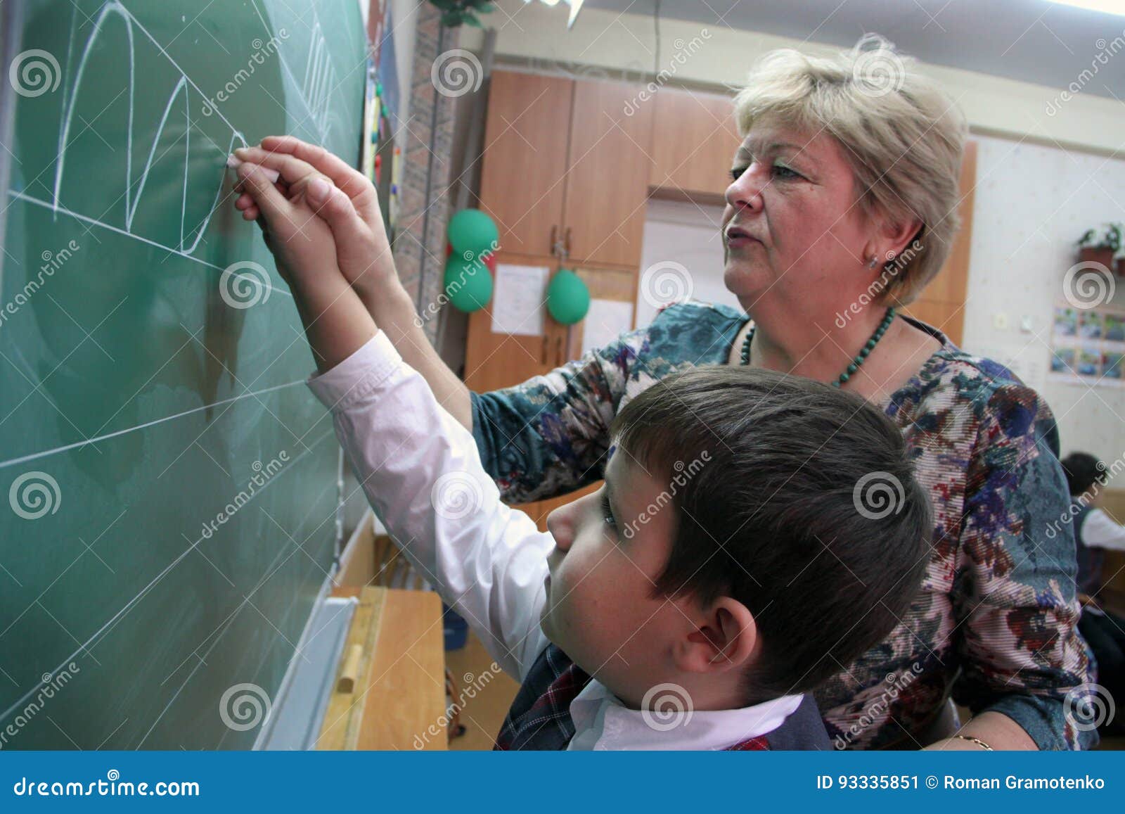 Teacher and Student at Blackboard Editorial Photo - Image of chalkboard ...