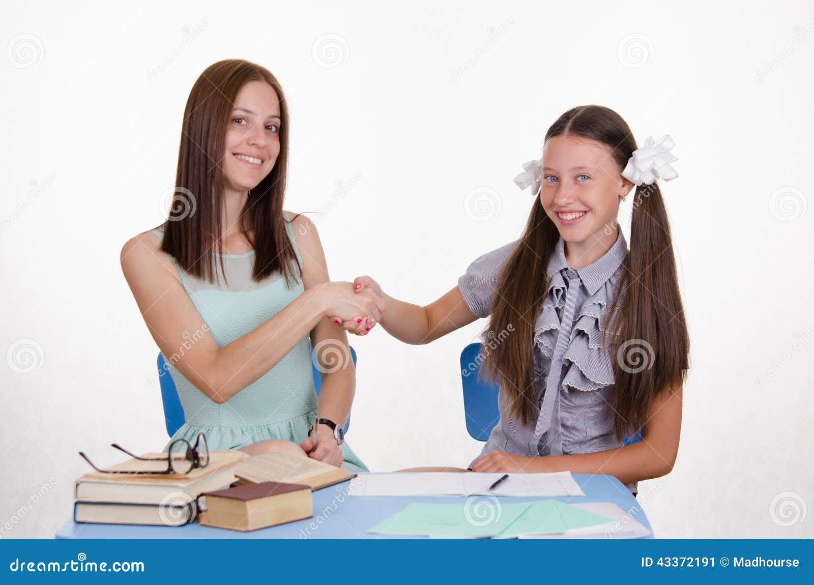 Teacher and Student Happily Shake Hands with Each Other Stock Image ...