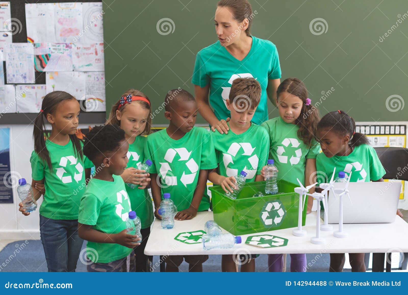 Teacher and Student Interacting Together in Classroom Stock Photo ...