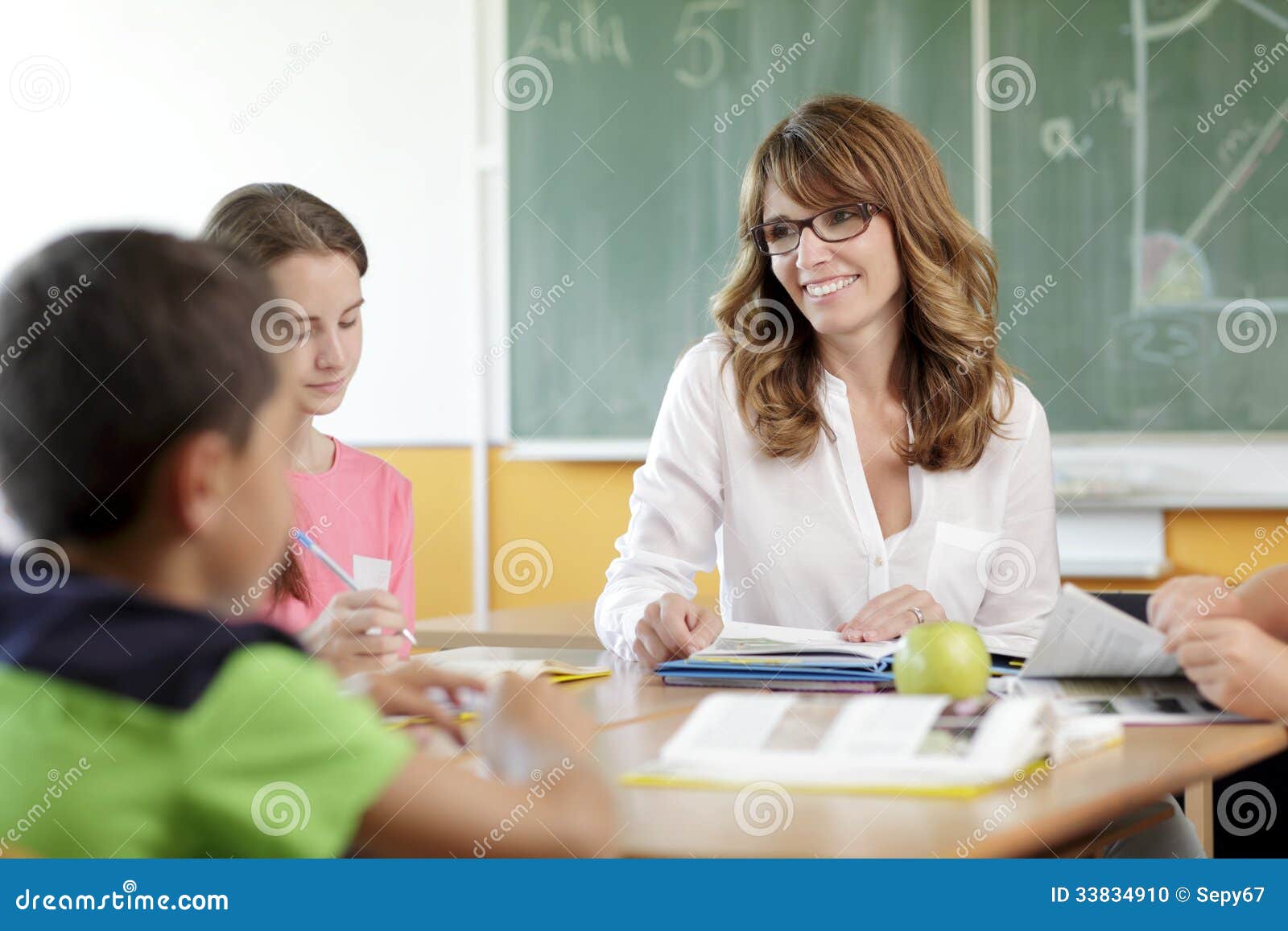 Teacher and Student in Lesson Stock Photo - Image of lifestyle, group ...