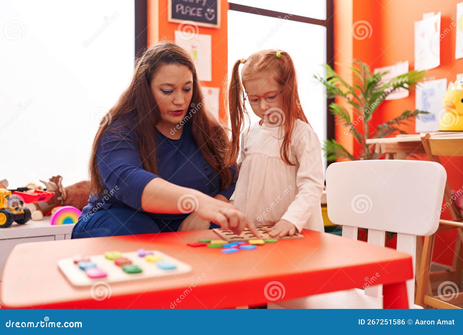 Teacher and Student Playing with Maths Puzzle Game at Kindergarten ...