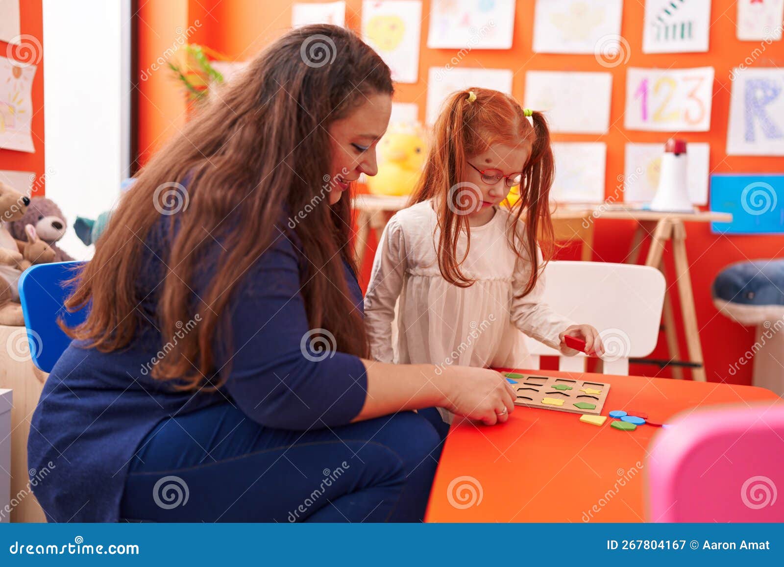 Teacher and Student Playing with Maths Puzzle Game at Kindergarten ...
