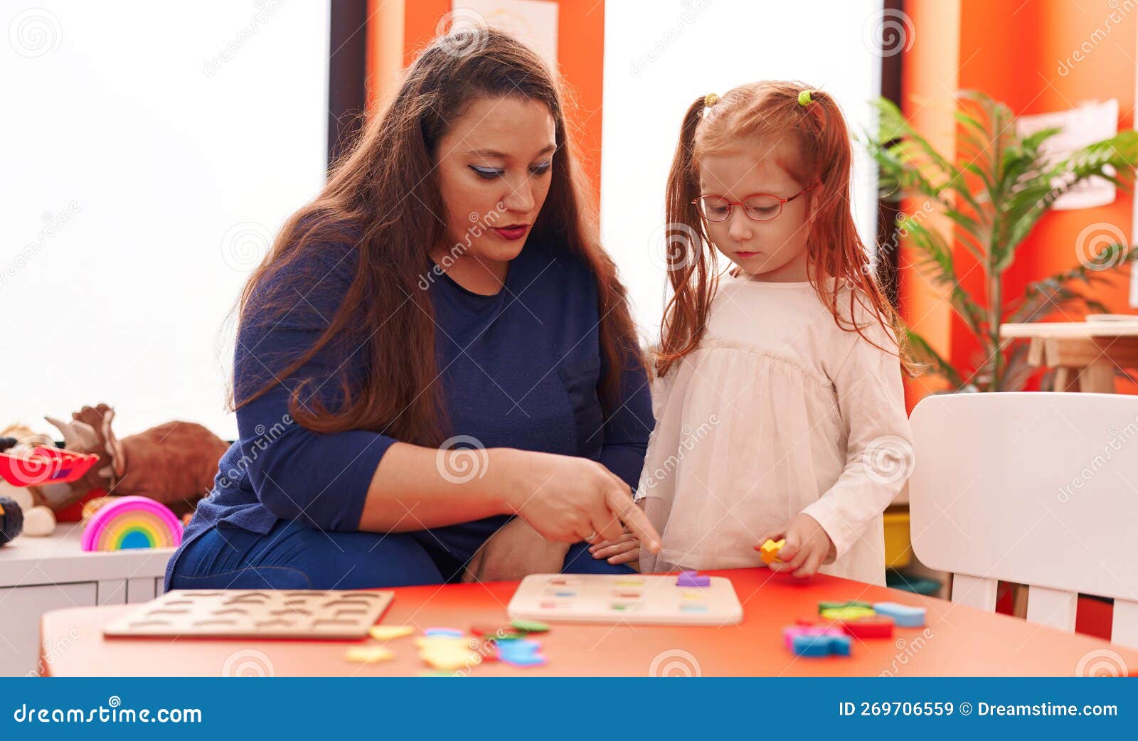 Teacher and Student Playing with Maths Puzzle Game at Kindergarten ...