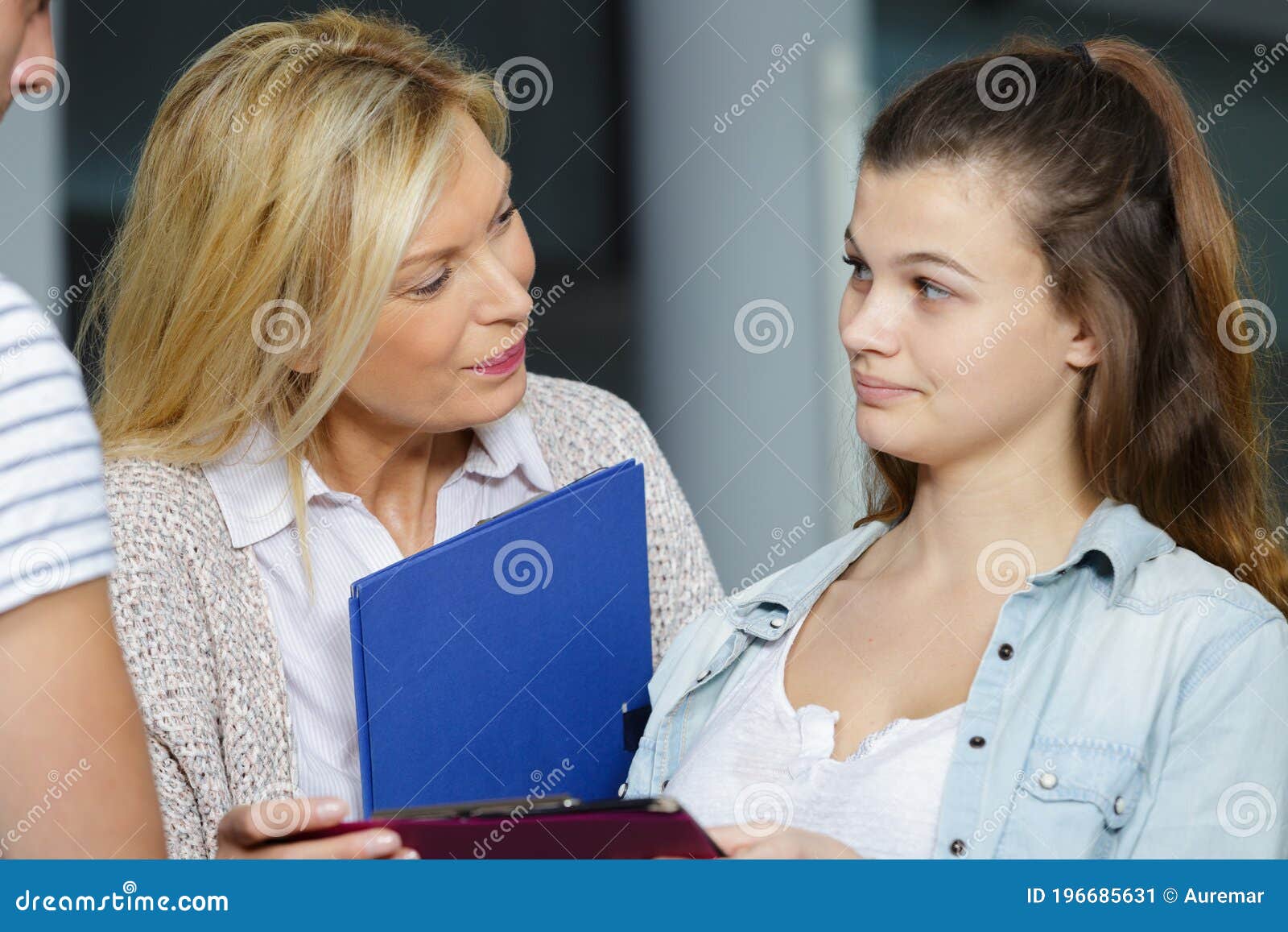 Teacher and Student Talking Stock Image - Image of education, holding ...