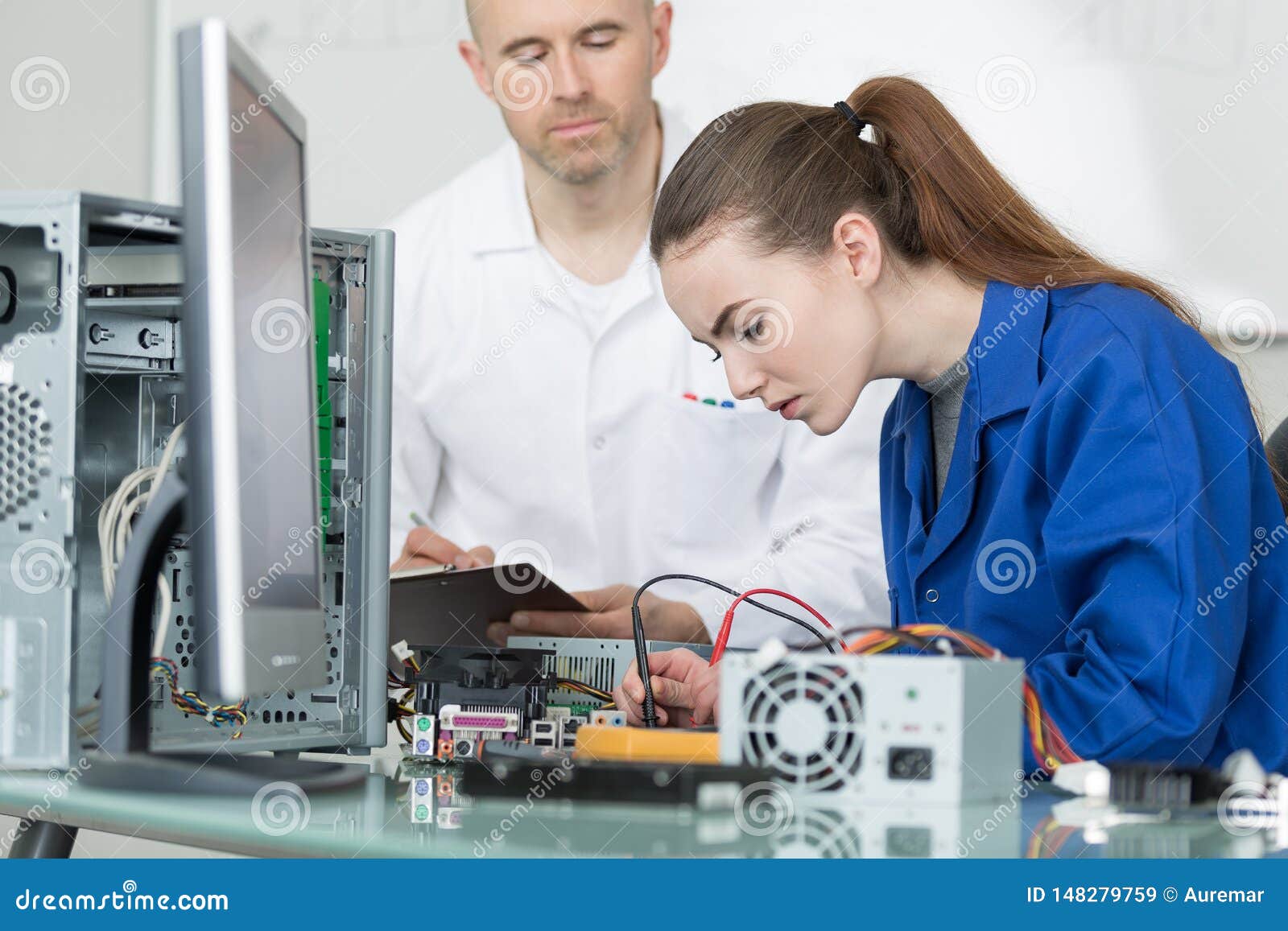 Teacher with Student in Technology Repairing Computer Stock Image ...
