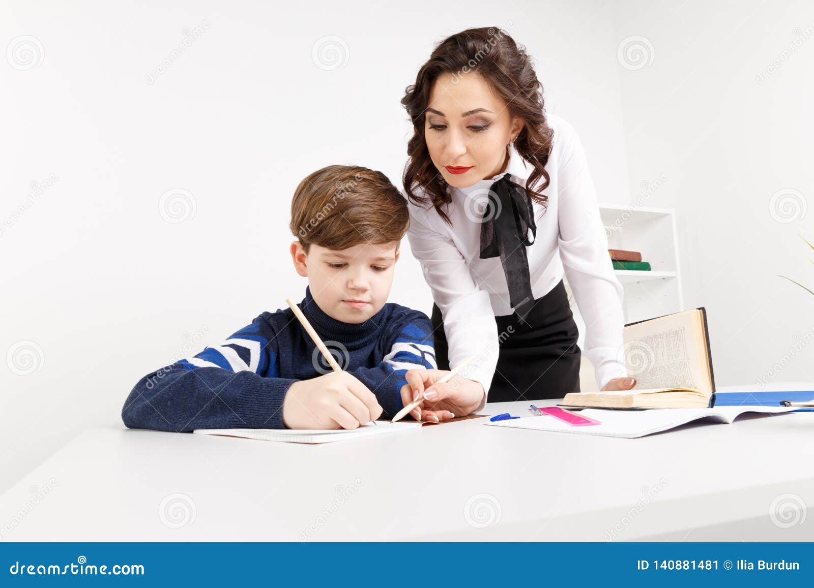 Teacher and Student Working Together and Getting New Information. Stock ...