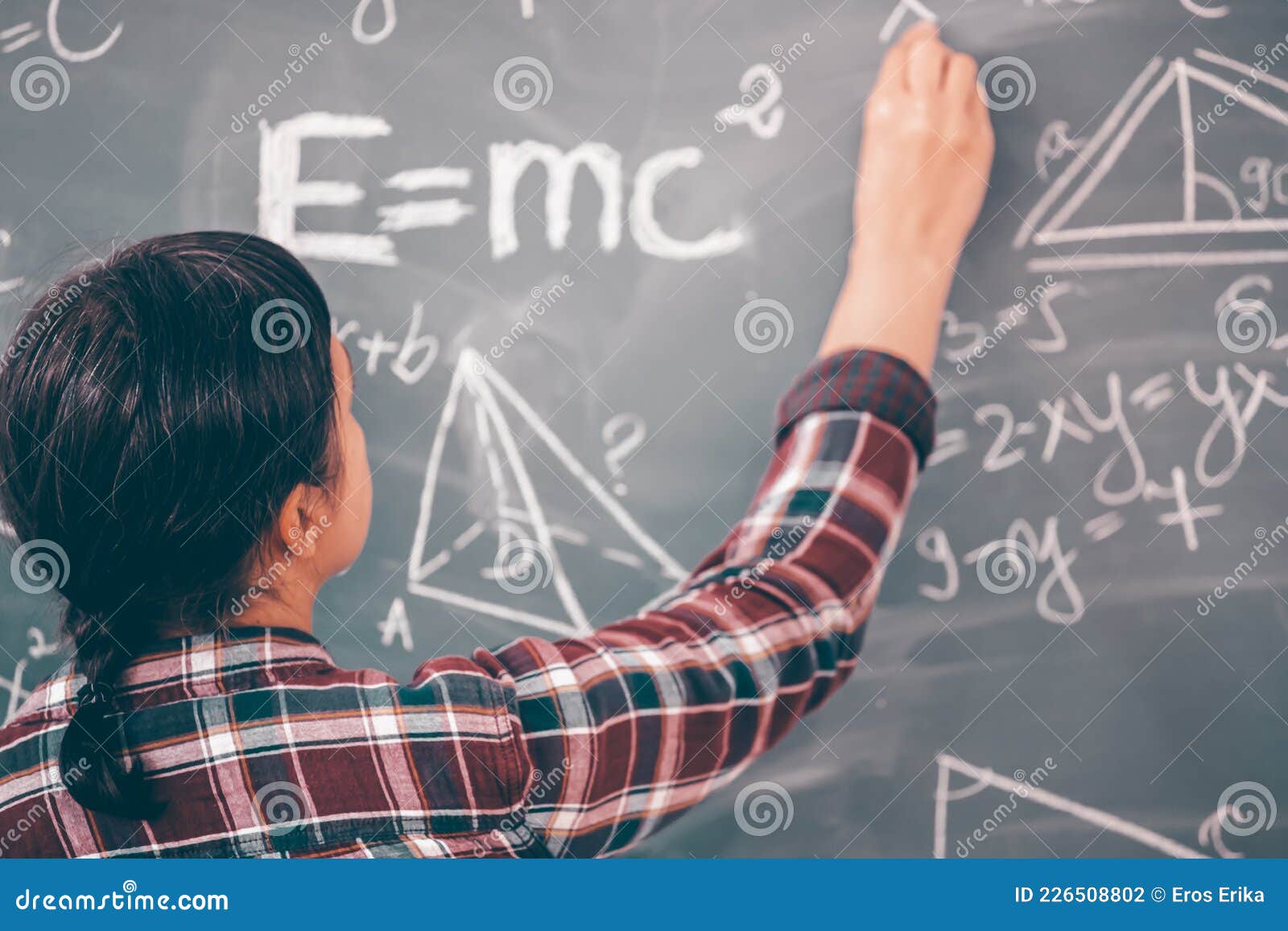 Teacher or Student Writing on Blackboard during Math Lesson in School ...