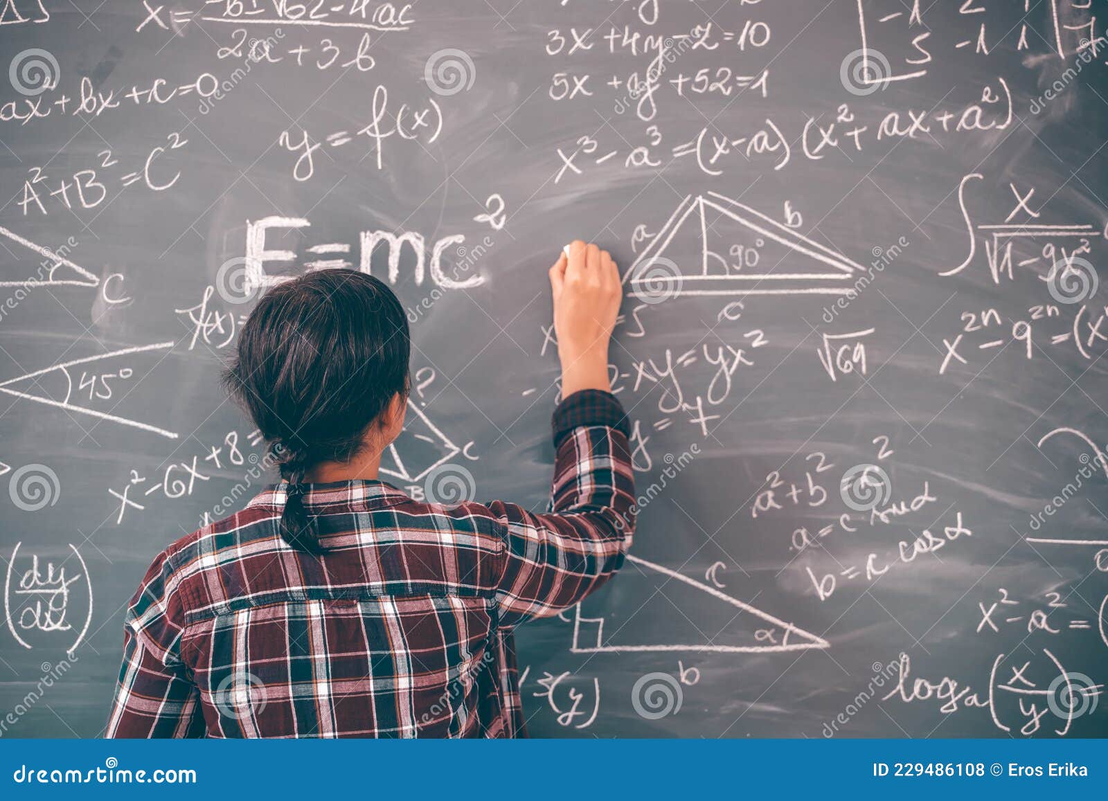 Teacher or Student Writing on Blackboard during Math Lesson in School ...