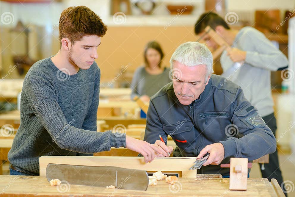 Teacher and Students in Carpentry Class Stock Image - Image of trade ...