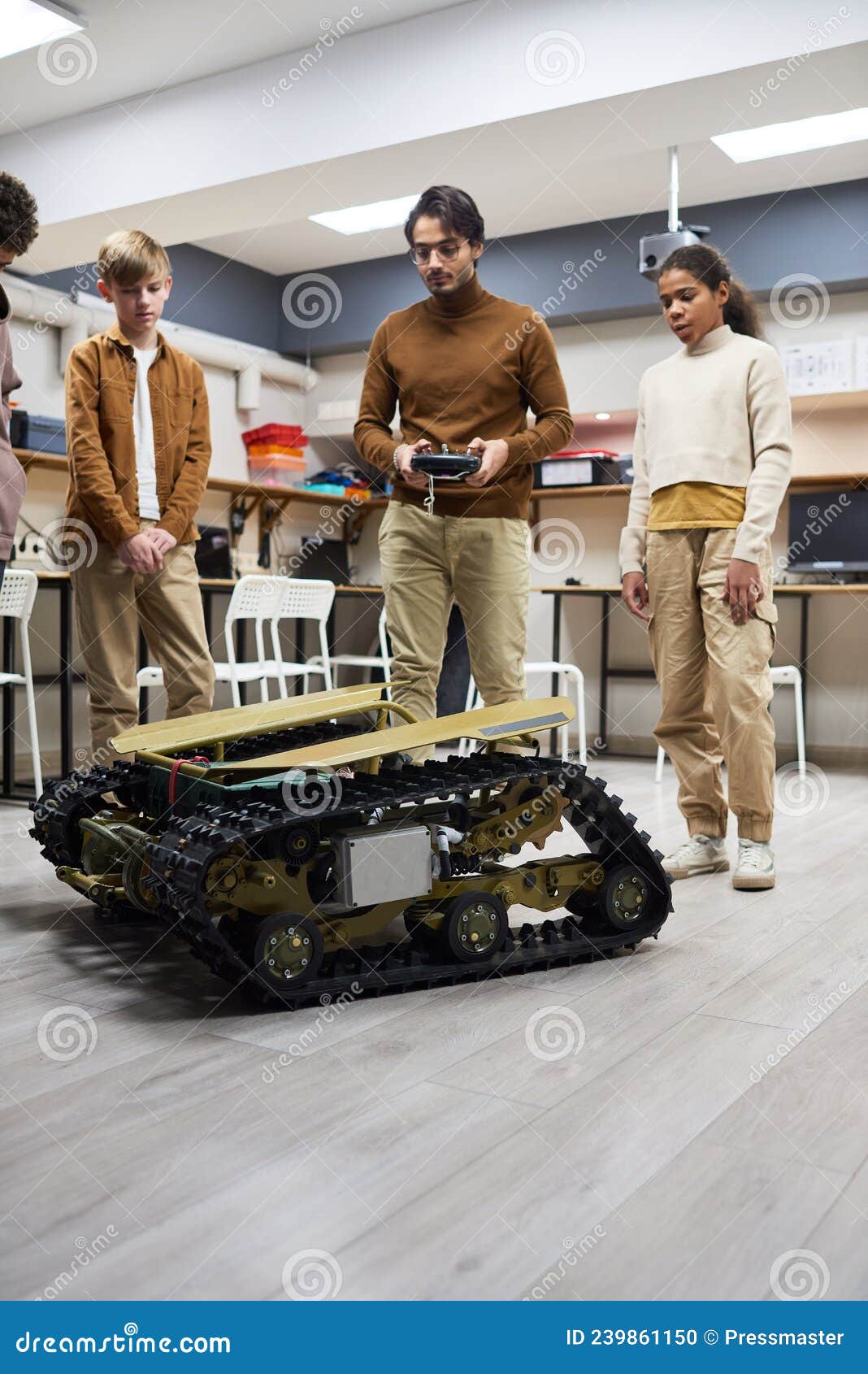 Teacher with Students Making a Big Robotic Machine Stock Photo - Image ...