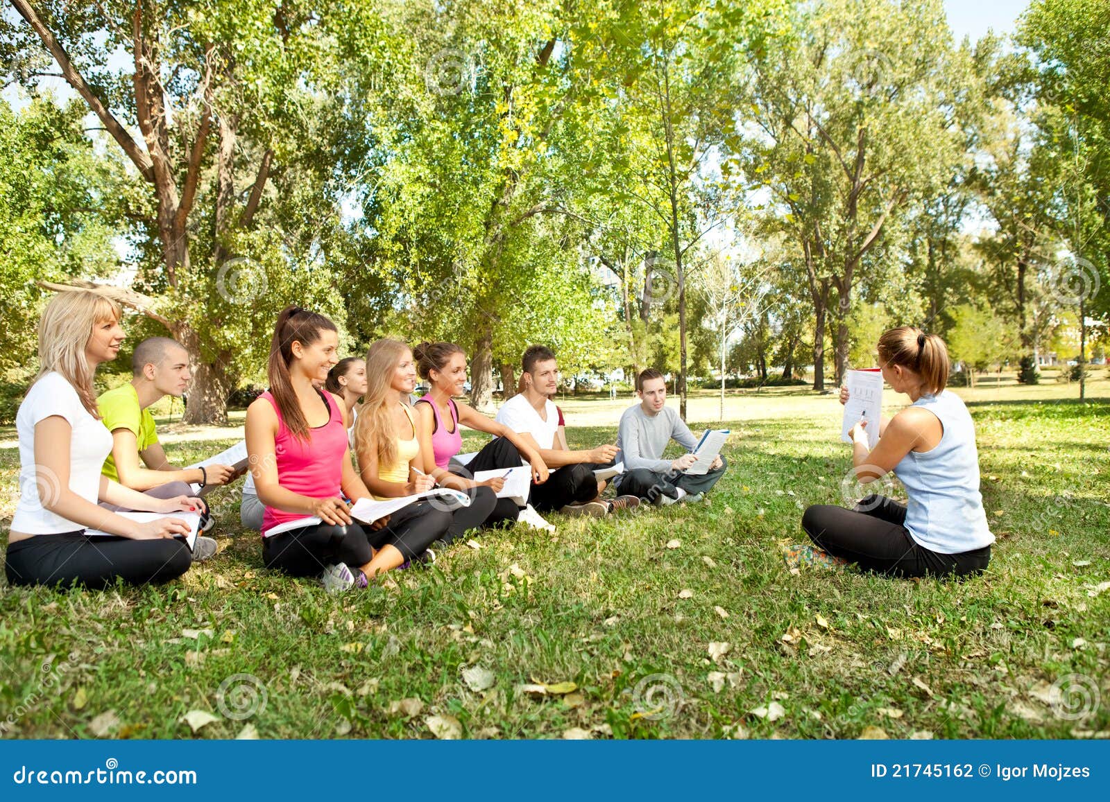 Teacher with Students in Park Stock Photo - Image of friendship, male ...