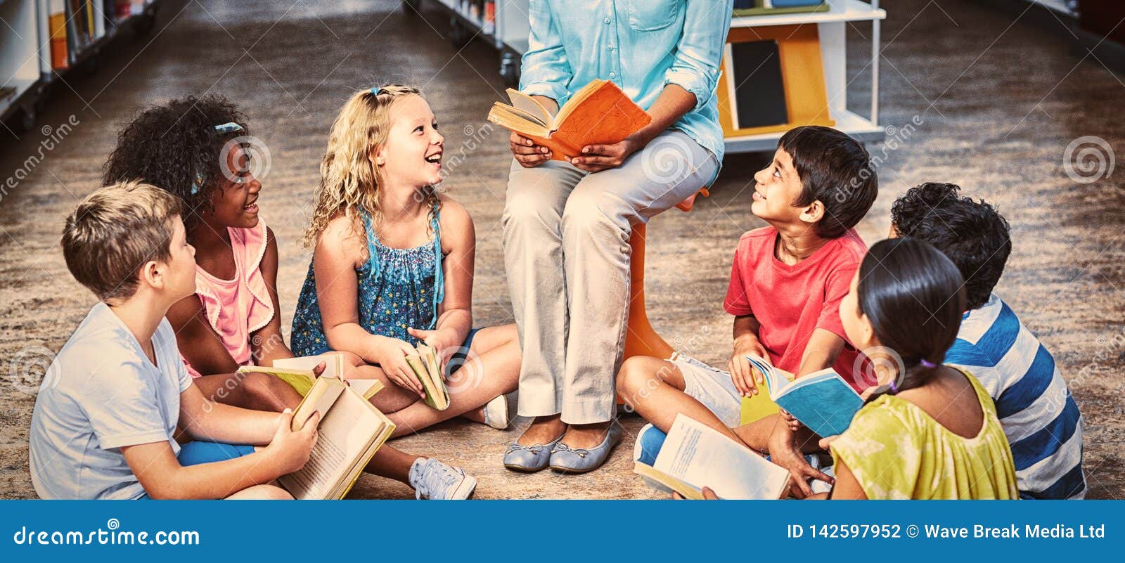 Teacher with Students Reading Books Stock Photo - Image of learning ...