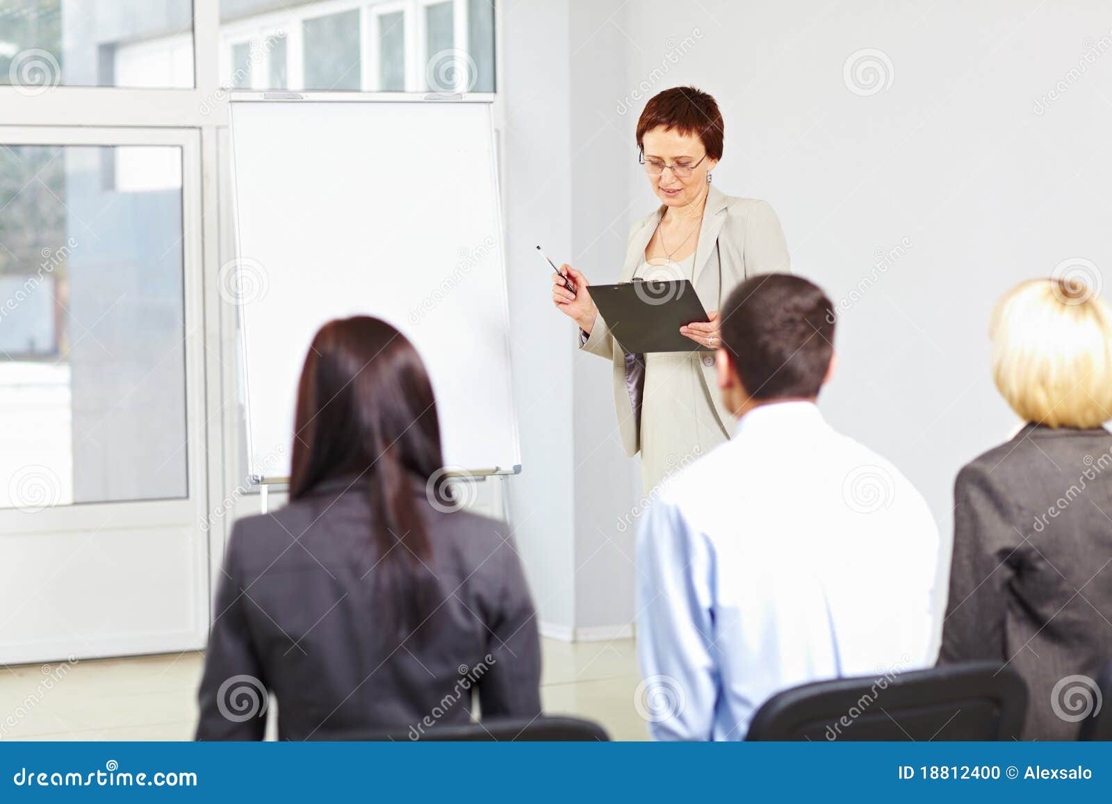 Teacher with Students on Seminar Stock Photo - Image of woman ...