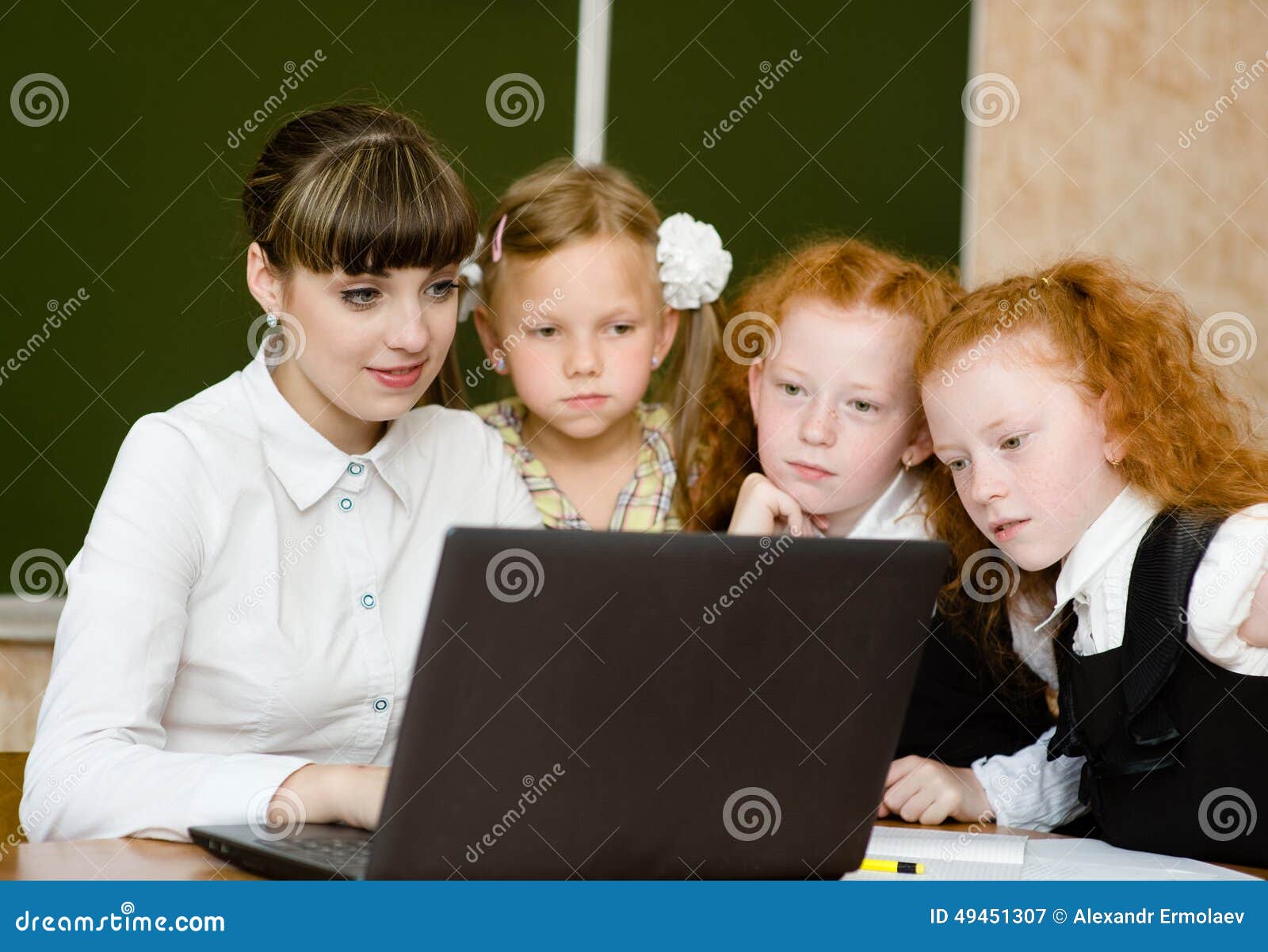 Teacher and Students Use Computers in the Classroom Stock Image - Image ...