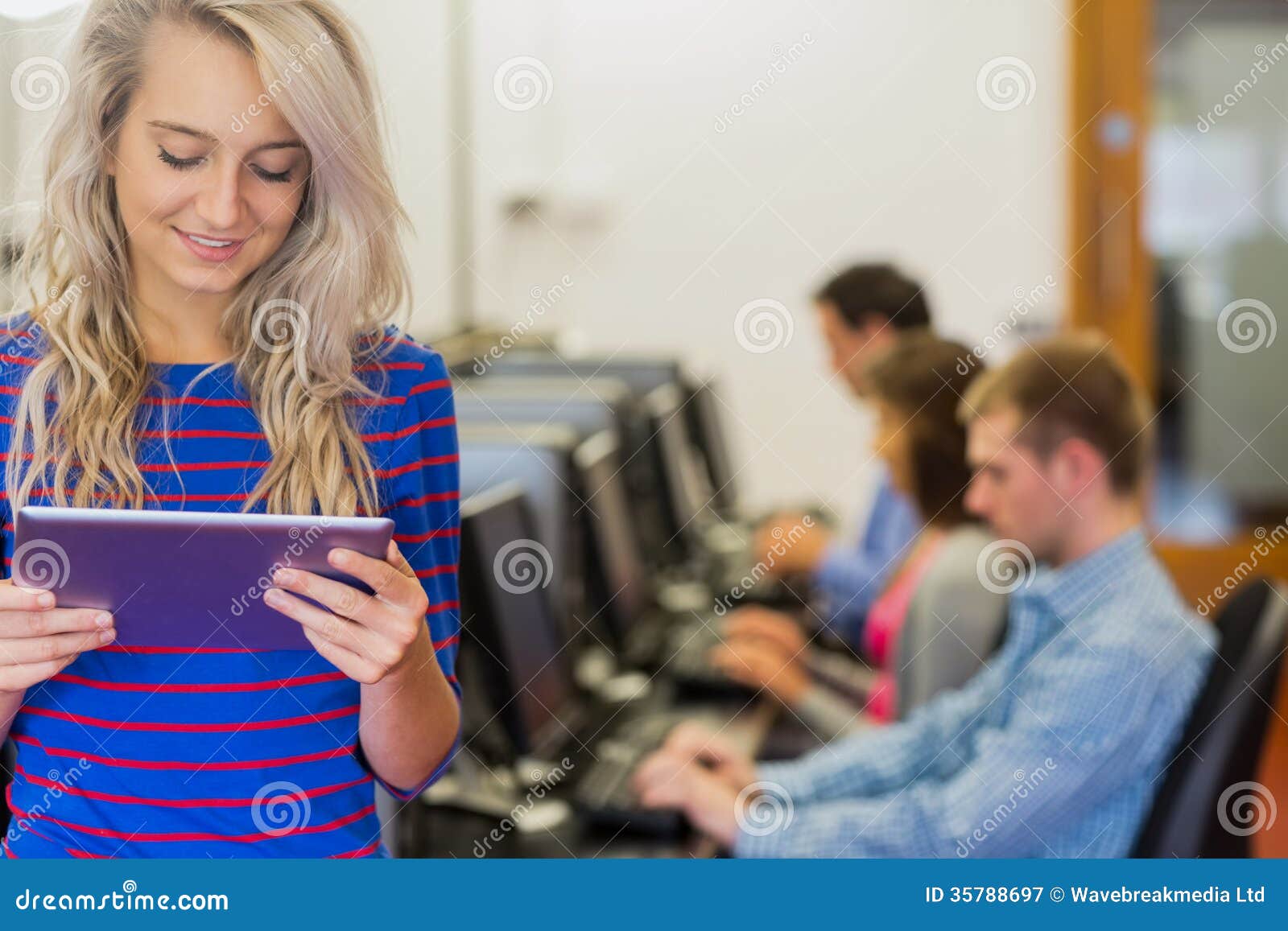 Teacher with Students Using Computers in Computer Room Stock Image ...