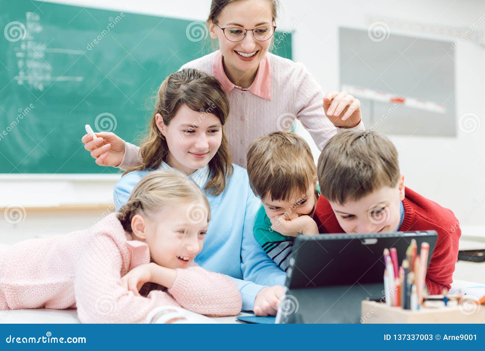 Teacher and Students Using Media and Technology in Classroom Stock ... Teacher and Students Using Media and Technology in Classroom Stock ...