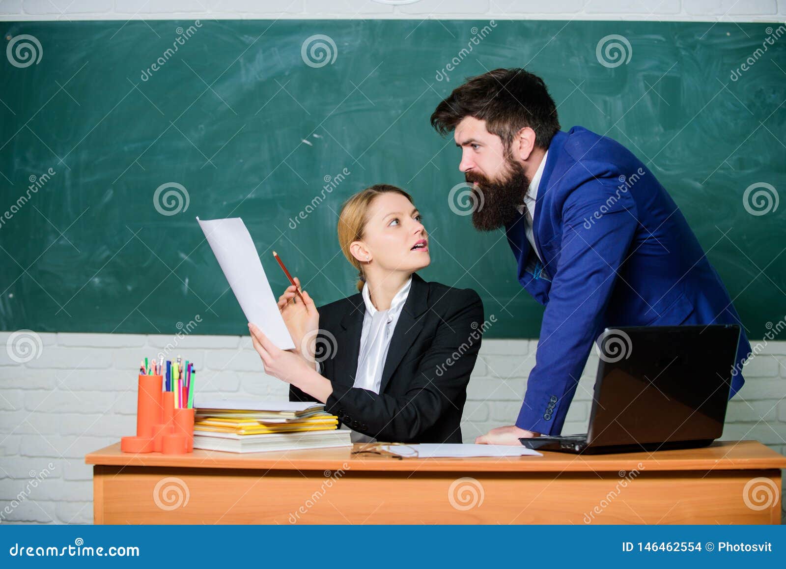 Teacher and Supervisor Working Together in School Classroom ...