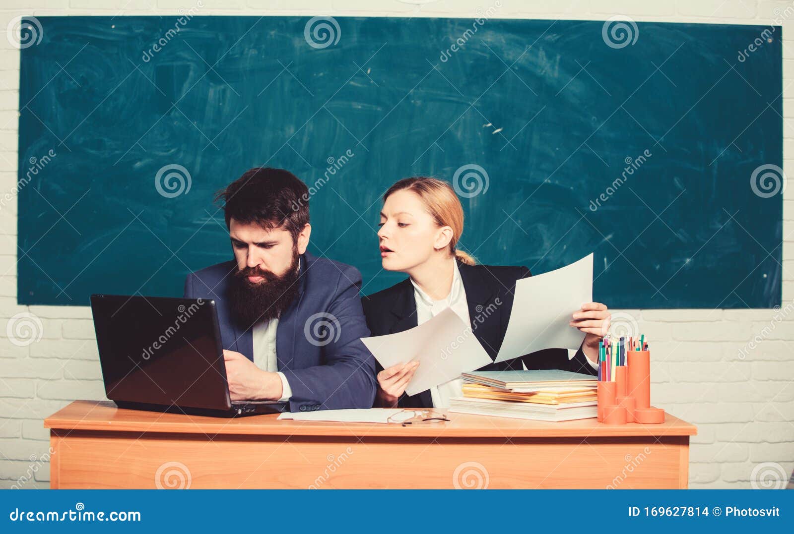 Teacher and Supervisor Working Together in School Classroom. School ...