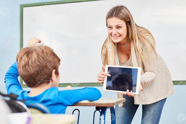 Teacher Using Tablet in Computer Science Class Stock Photo - Image of ...