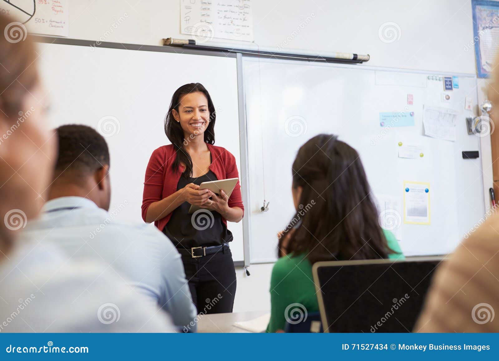 Teacher with Tablet and Students at an Adult Education Class Stock ...