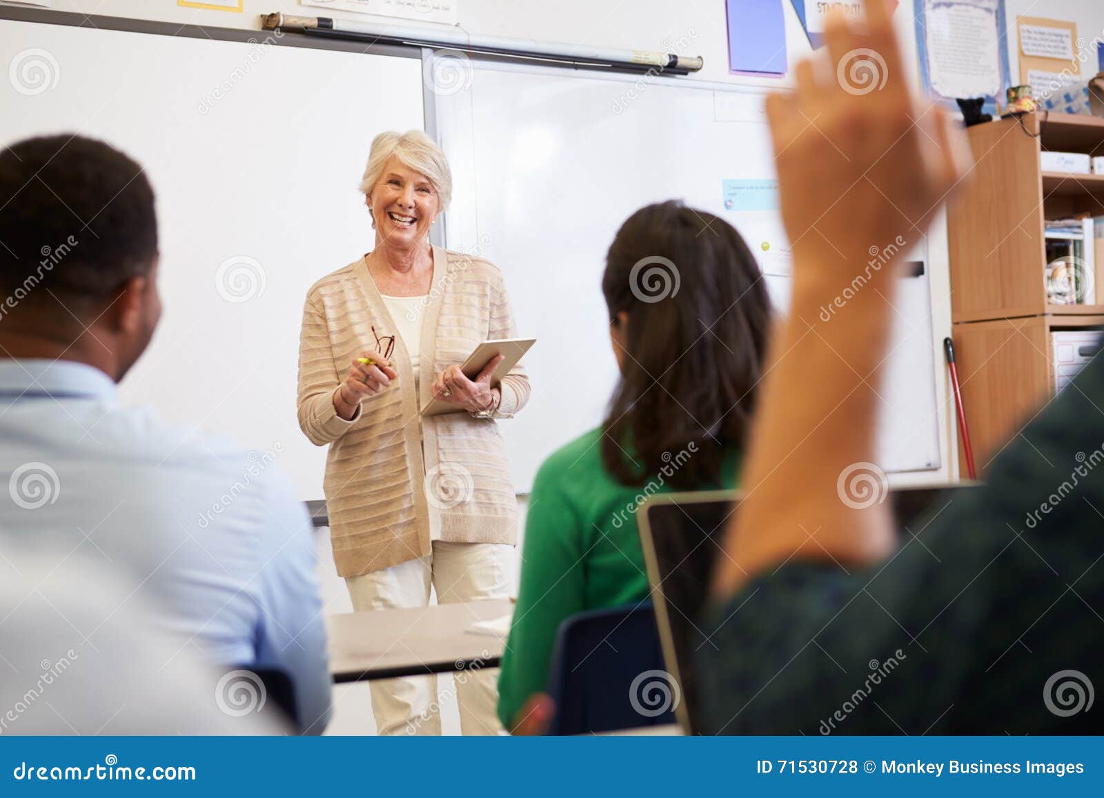 Teacher with Tablet and Students at an Adult Education Class Stock ...