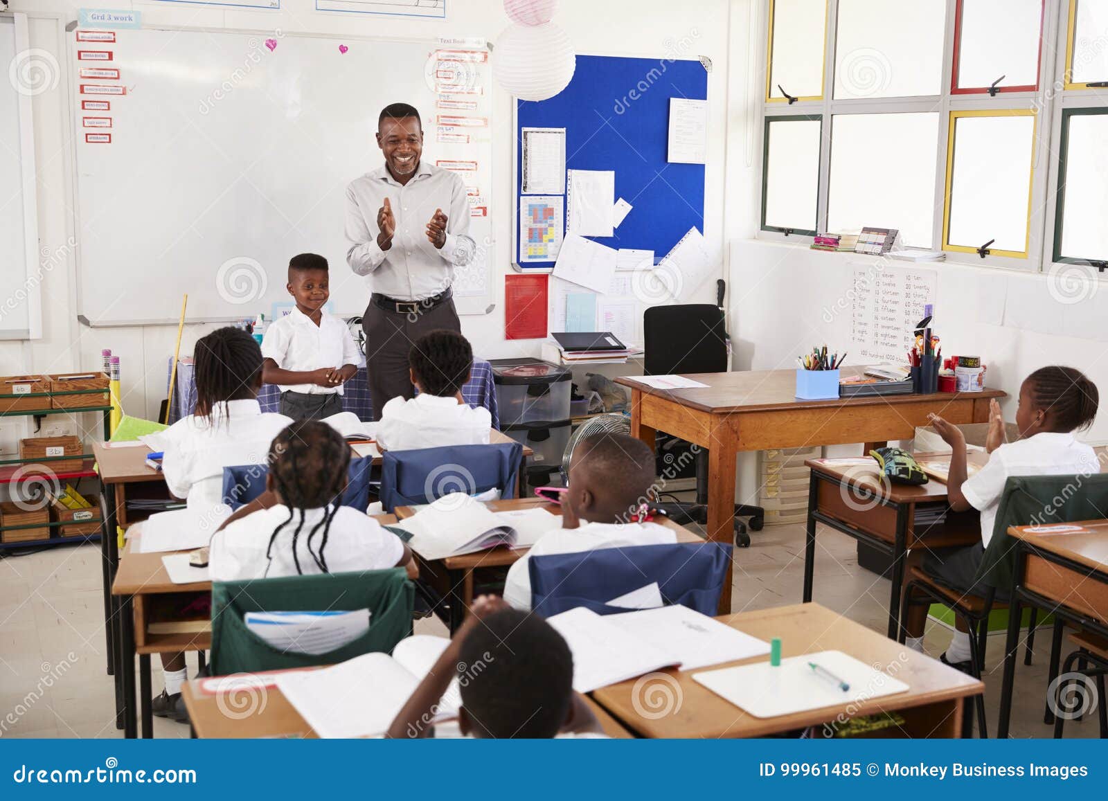 Teacher Taking a Lesson of Elementary School Kids Stock Image - Image ...