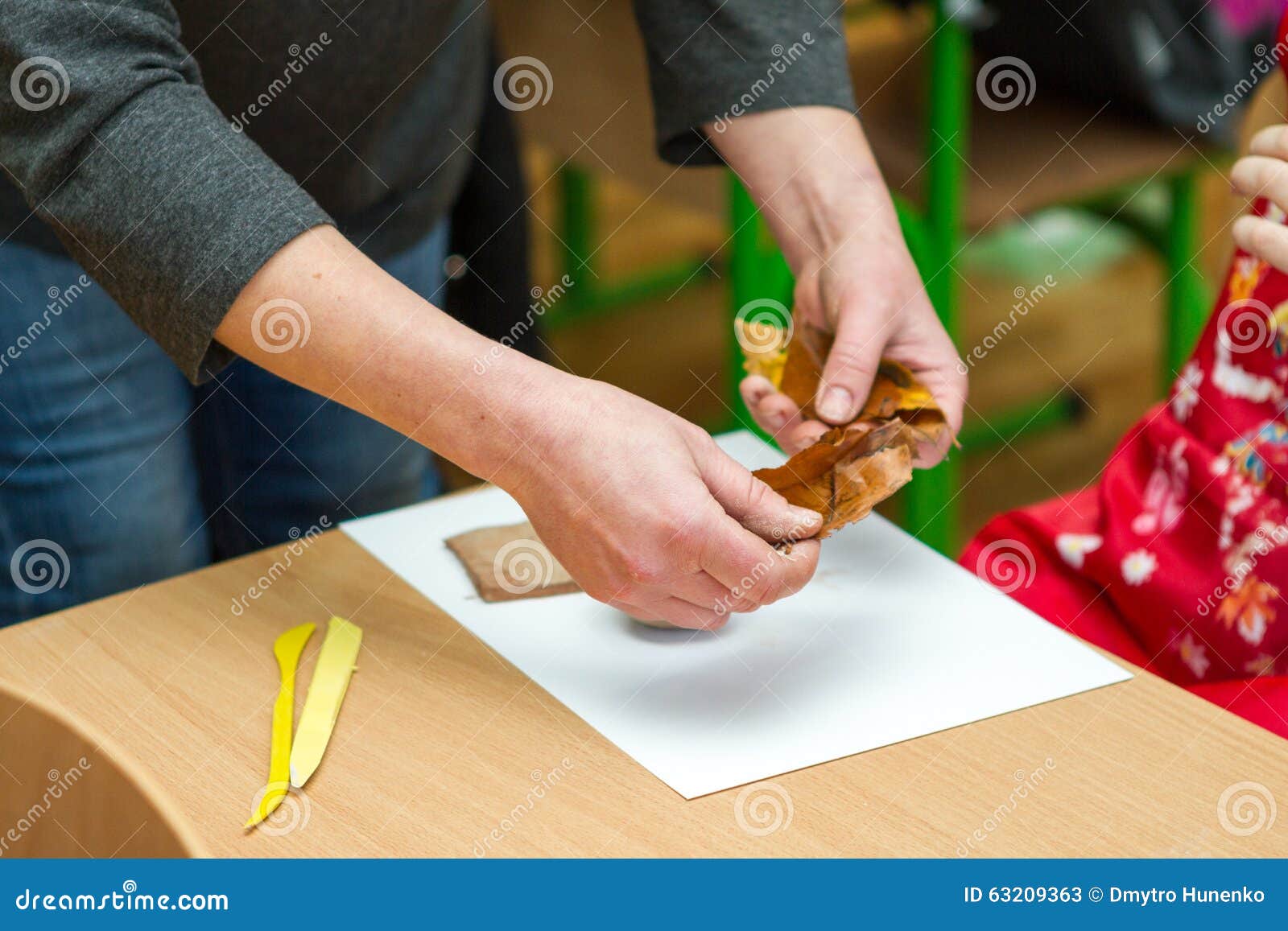 The Teacher Teaches the Student To Sculpt with Clay. Stock Image ...