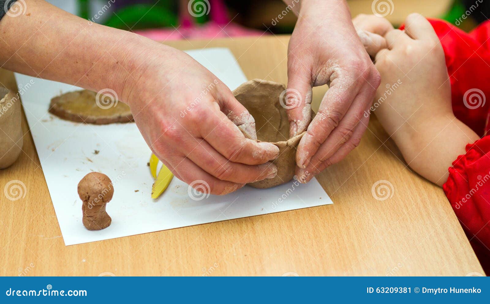 The Teacher Teaches the Student To Sculpt with Clay. Stock Image ...