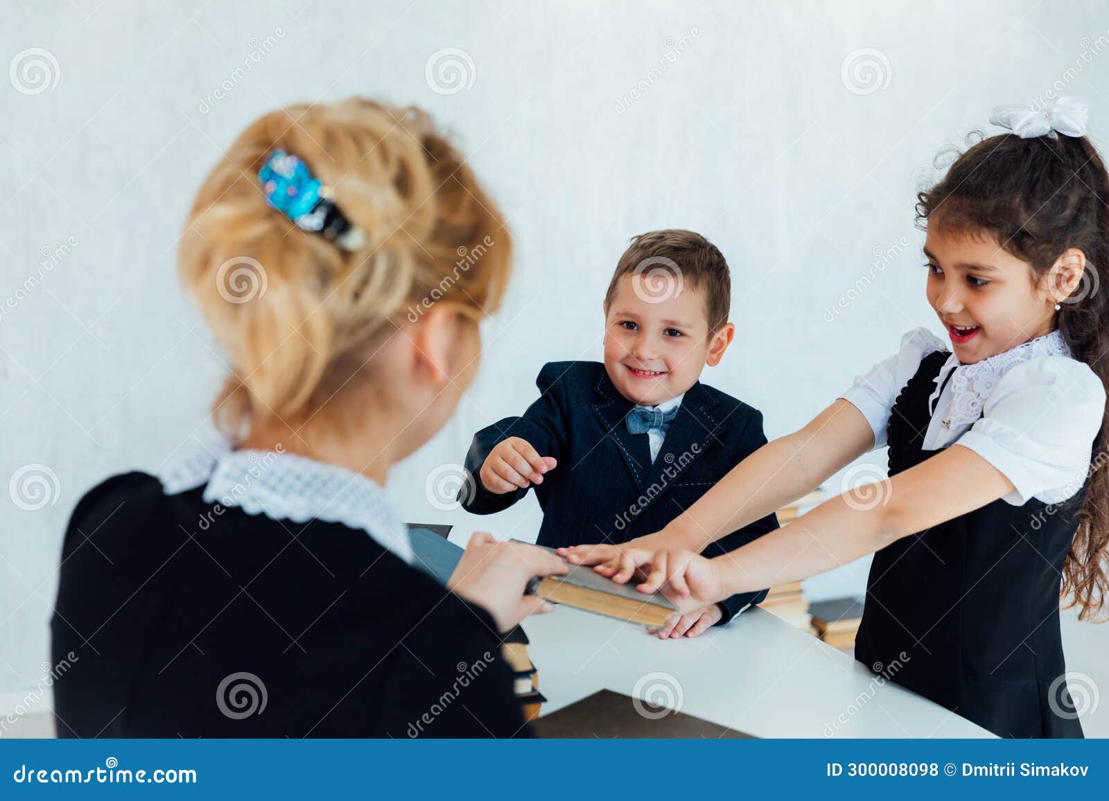 Teacher Teaching Children in School Classroom Stock Photo - Image of ...