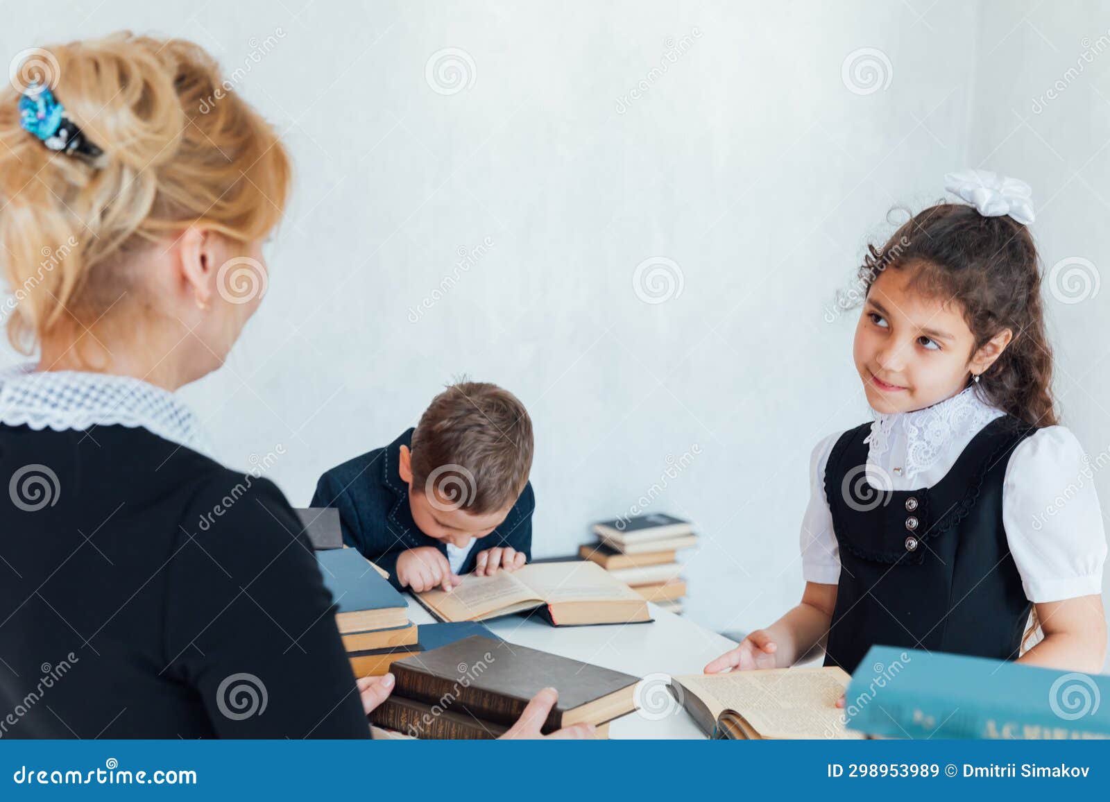 Teacher Teaching Children at School in Lesson Stock Image - Image of ...