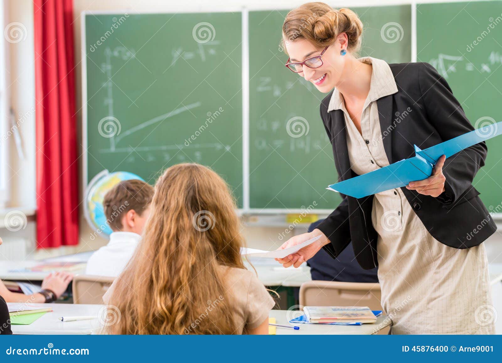 Teacher Teaching a Class of Pupils in School Stock Photo - Image of ...