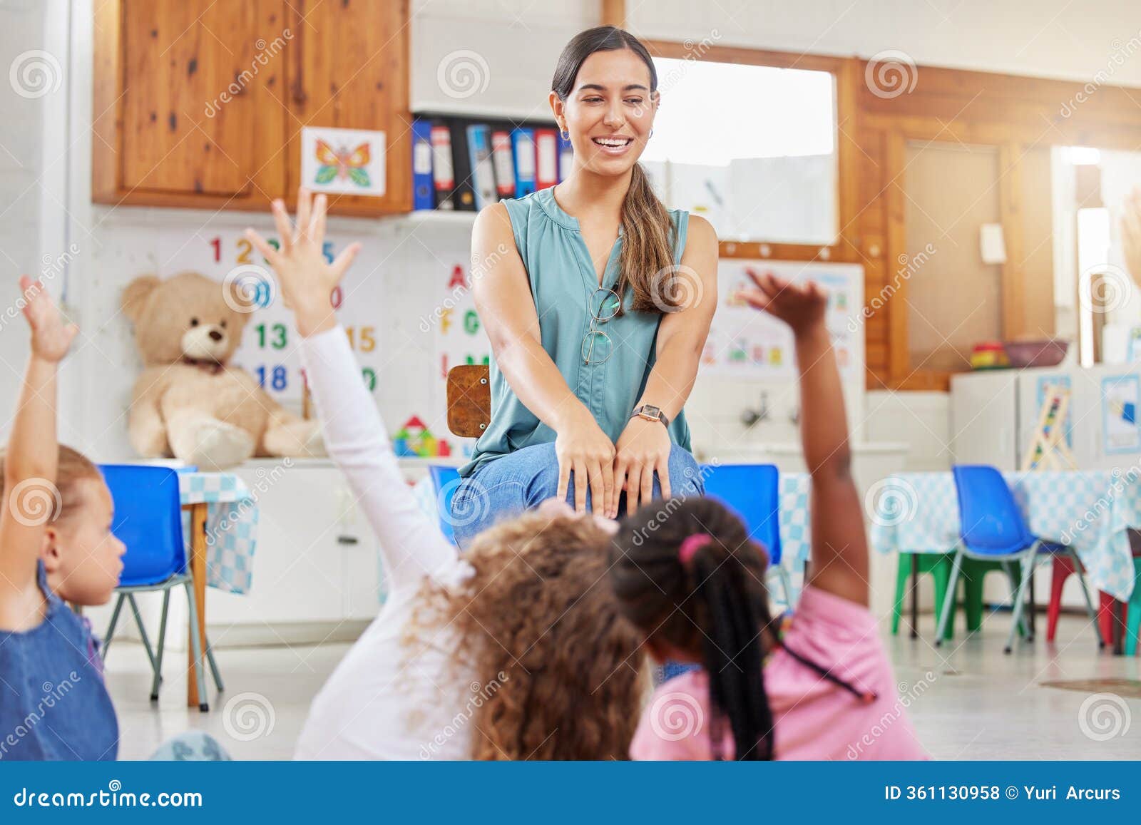Teacher, Teaching and Kids with Hands Raised in Classroom for Lesson ...