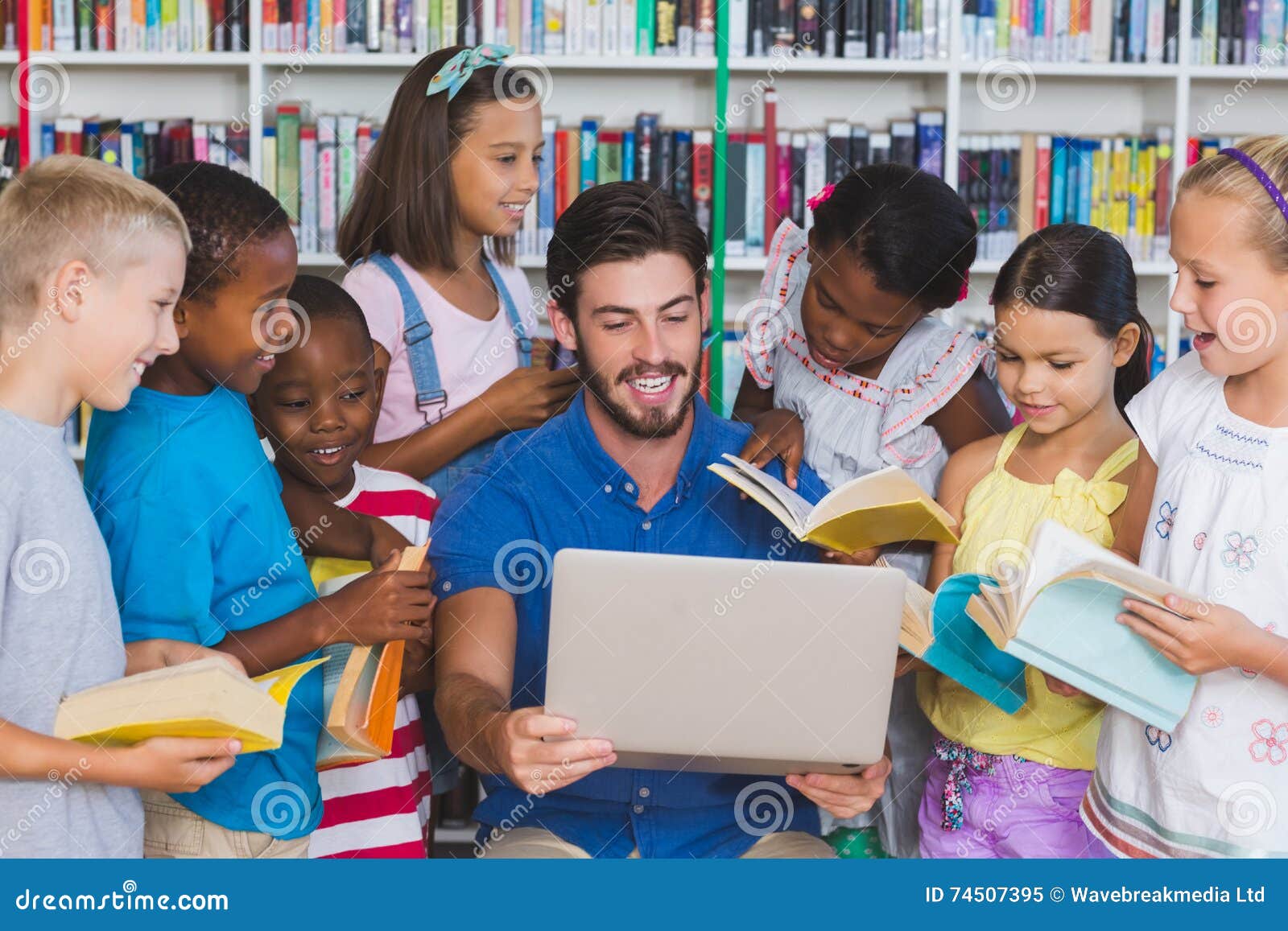 Teacher Teaching Kids on Laptop in Library Stock Image - Image of asian ...
