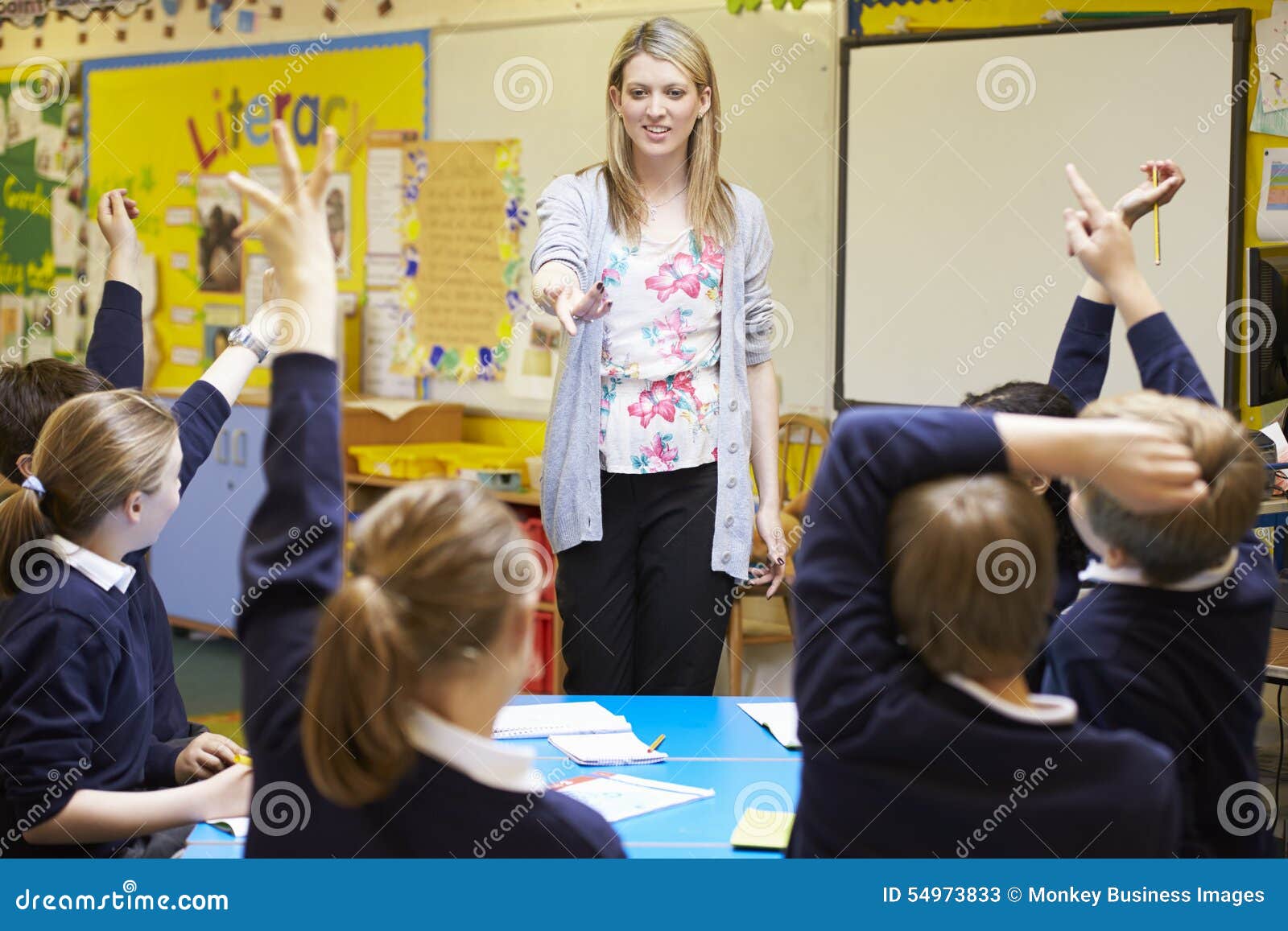 Teacher Teaching Lesson To Elementary School Pupils Stock Image - Image ...