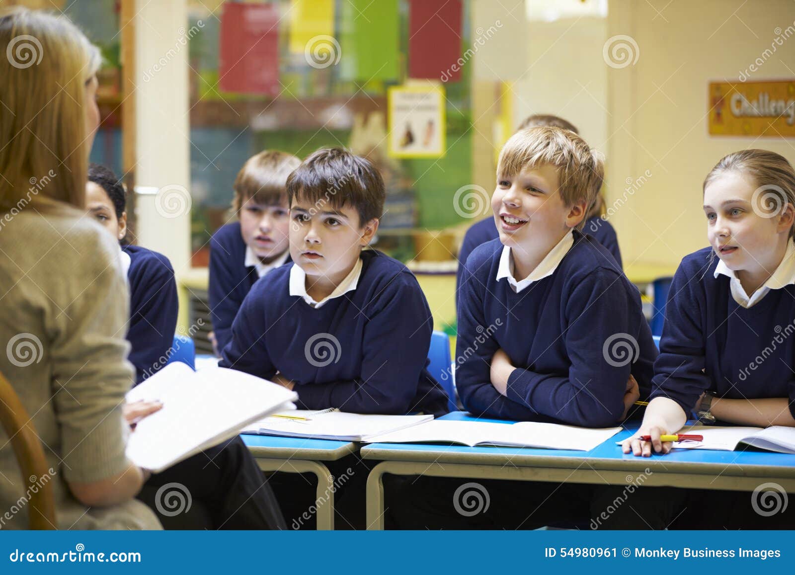 Teacher Teaching Lesson To Elementary School Pupils Stock Image - Image ... Teacher Teaching Lesson To Elementary School Pupils Stock Image - Image ...