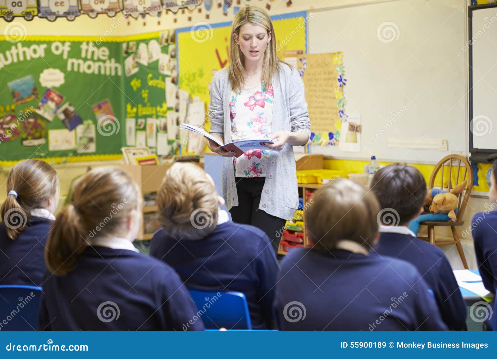 Teacher Teaching Lesson To Elementary School Pupils Stock Image - Image ...