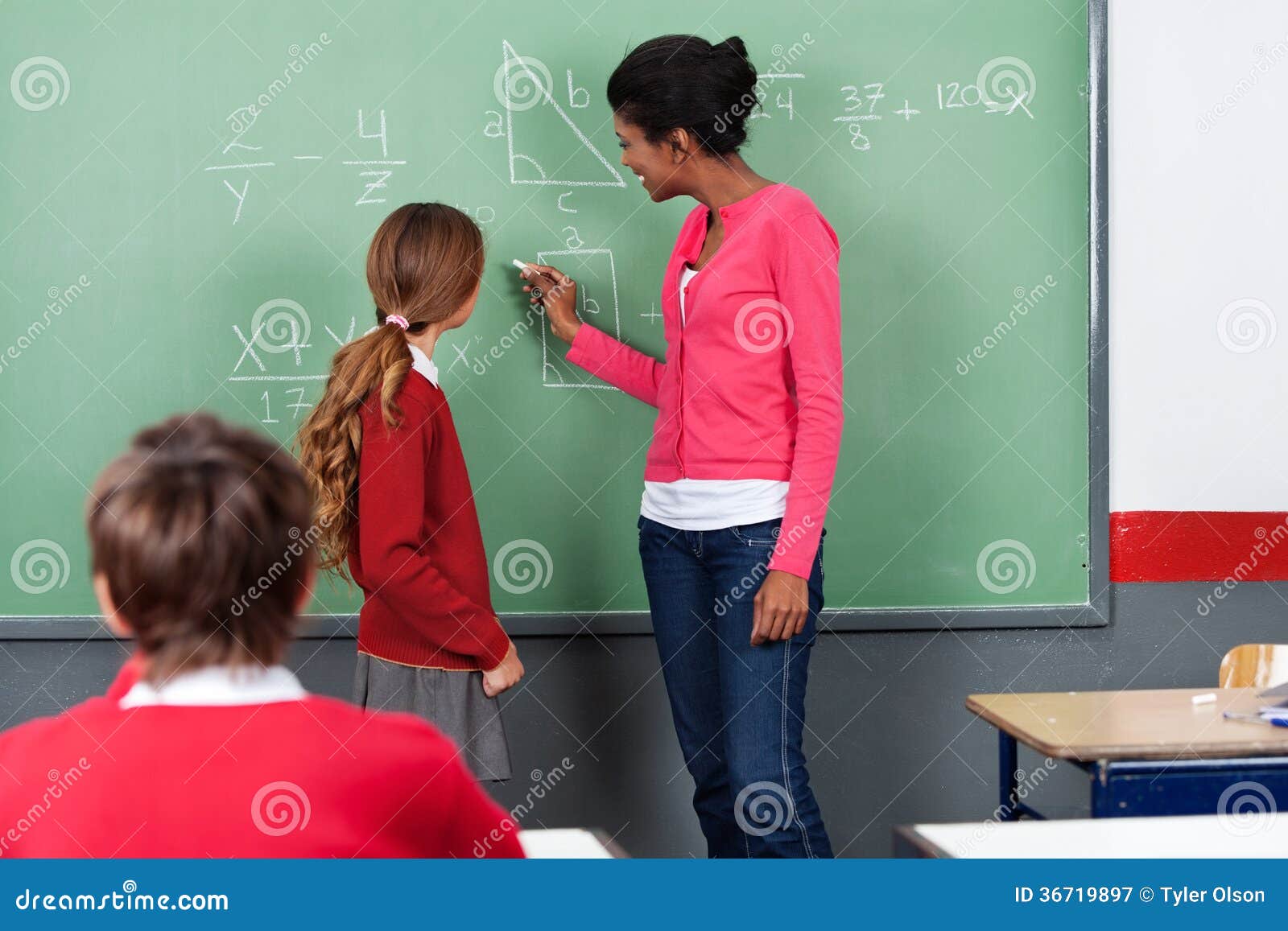 Teacher Teaching Mathematics To Students On Board Royalty Free Stock ... Teacher Teaching Mathematics To Students On Board Royalty Free Stock ...