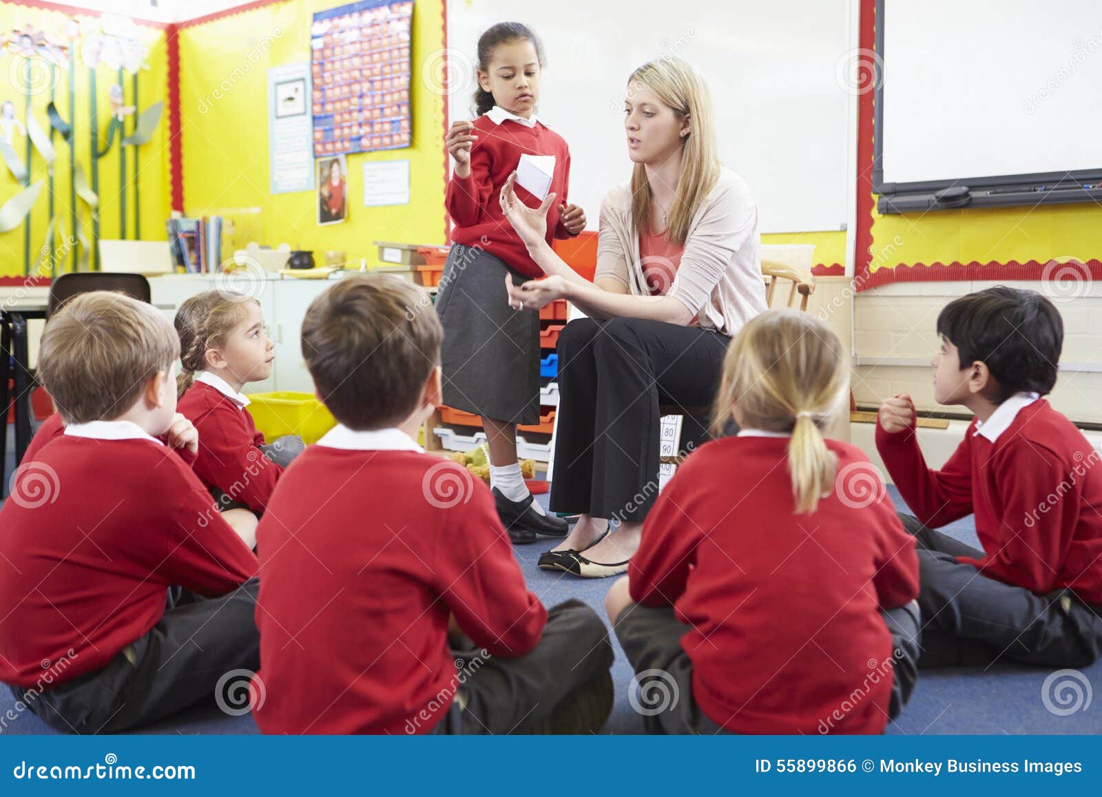 Teacher Teaching Maths To Elementary School Pupils Stock Photo - Image ...