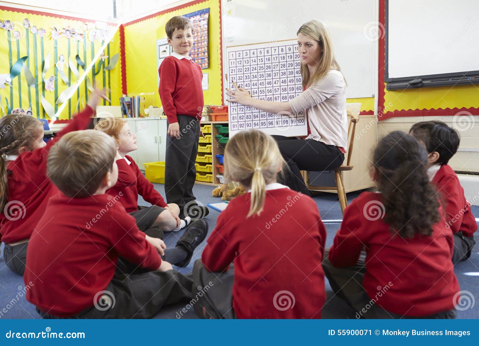 Teacher Teaching Maths To Elementary School Pupils Stock Image - Image ...