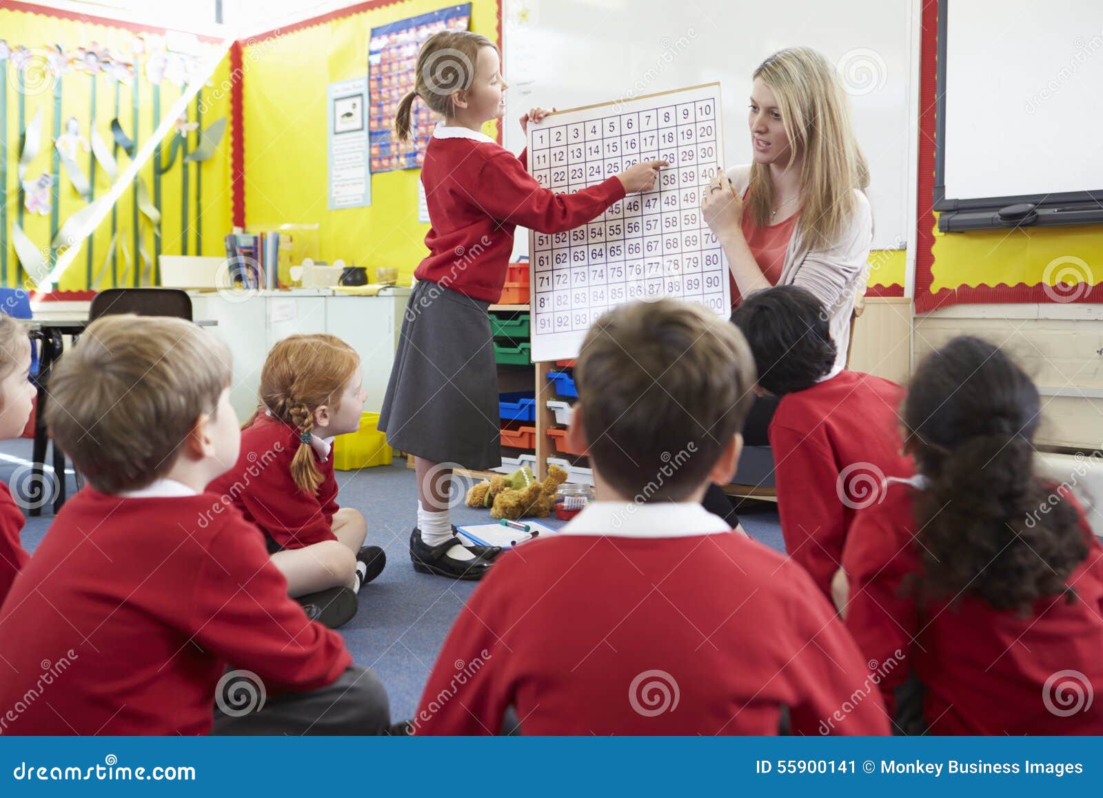 Teacher Teaching Maths To Elementary School Pupils Stock Image - Image ...